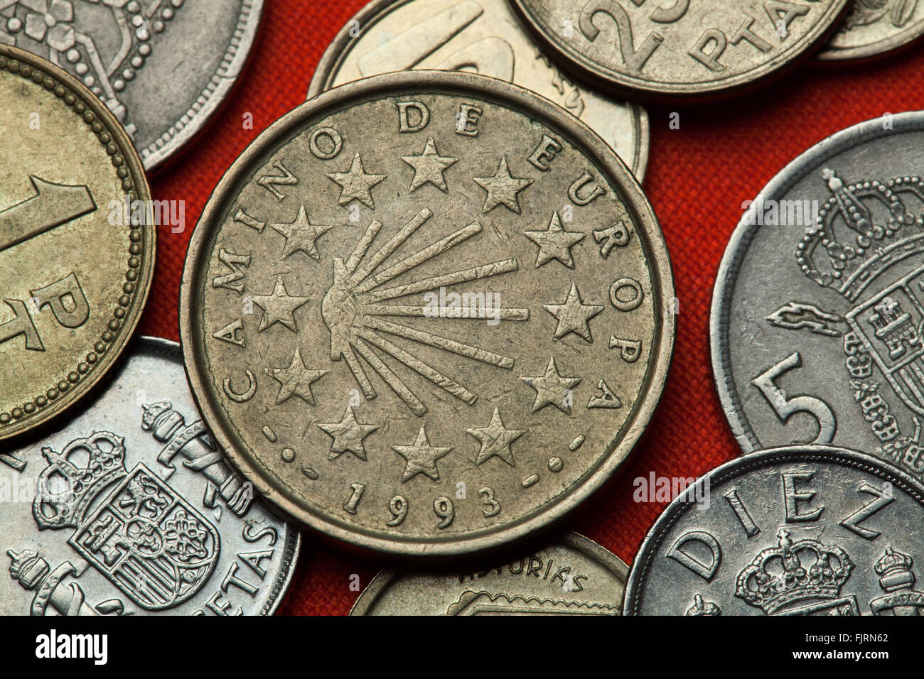 Coins of Spain. Scallop shell symbol for the pilgrimage routes Camino ...