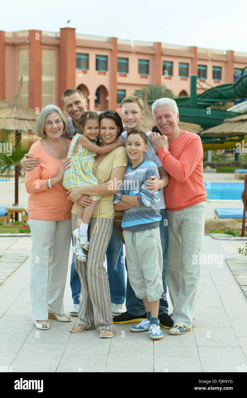 Happy family relaxing Stock Photo - Alamy