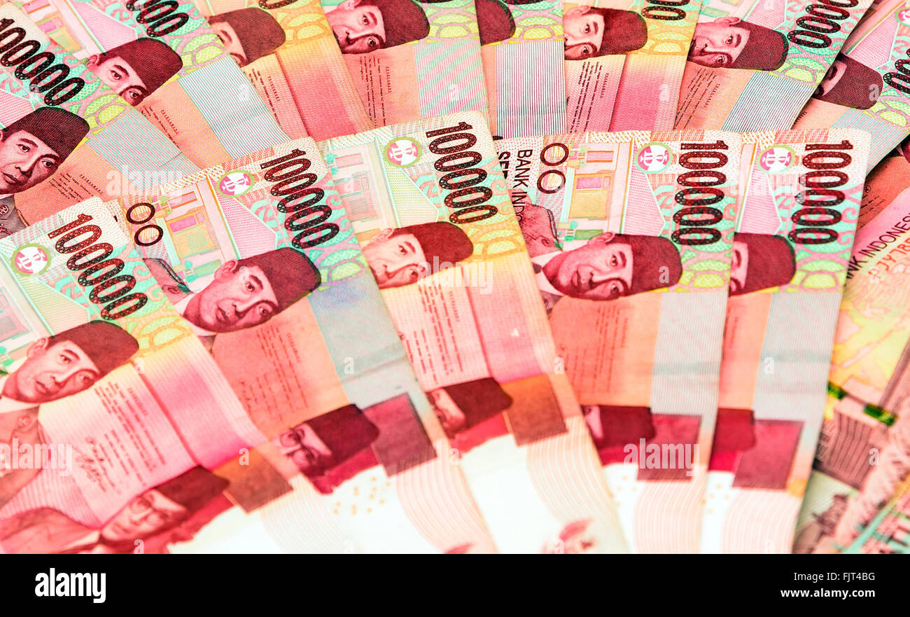 Indonesian Rupiah notes 100000 background. Selective focus Stock Photo ...