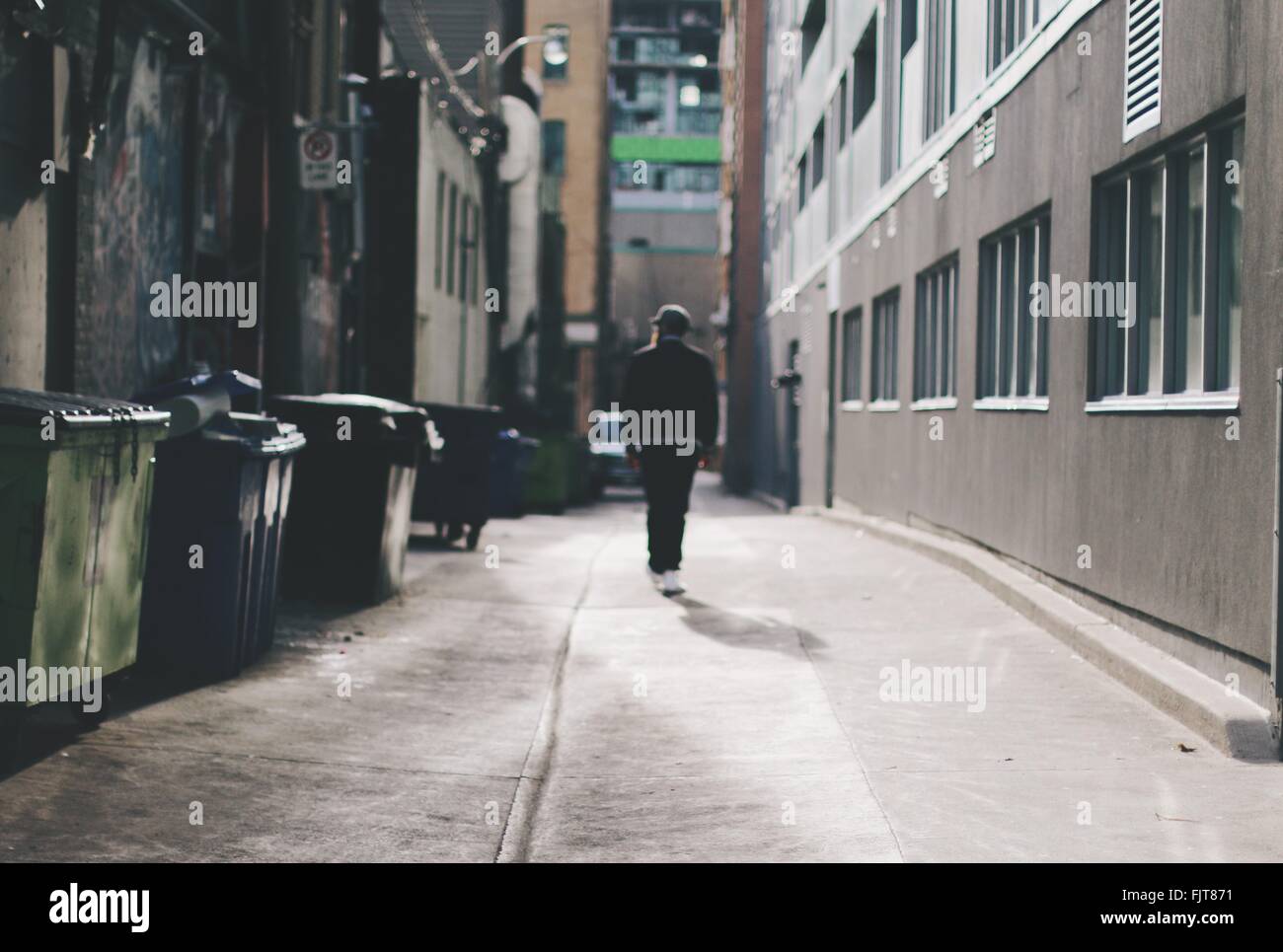 Walking in empty street hi-res stock photography and images - Alamy