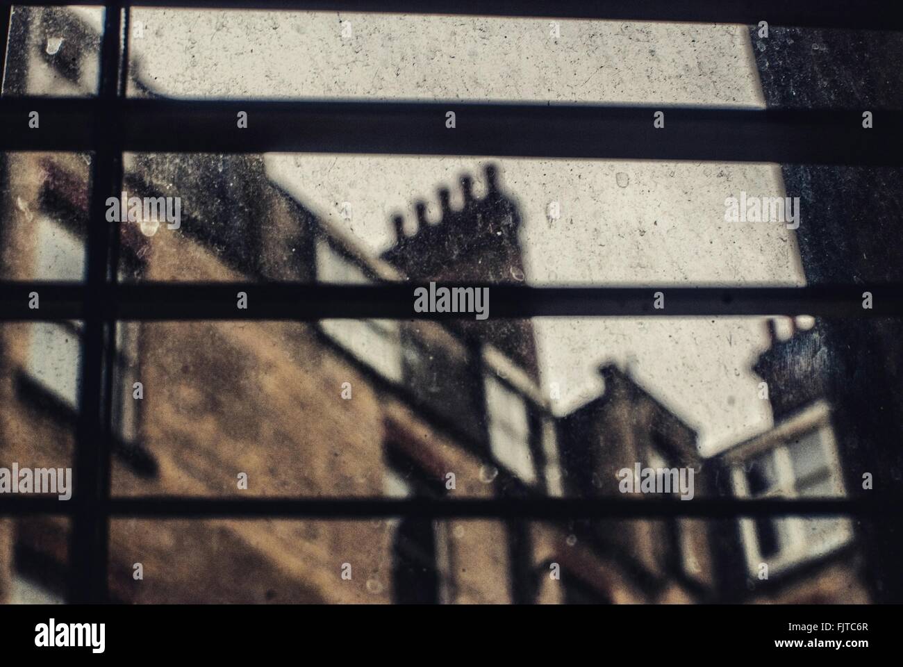 Buildings Seen Through Window Stock Photo - Alamy
