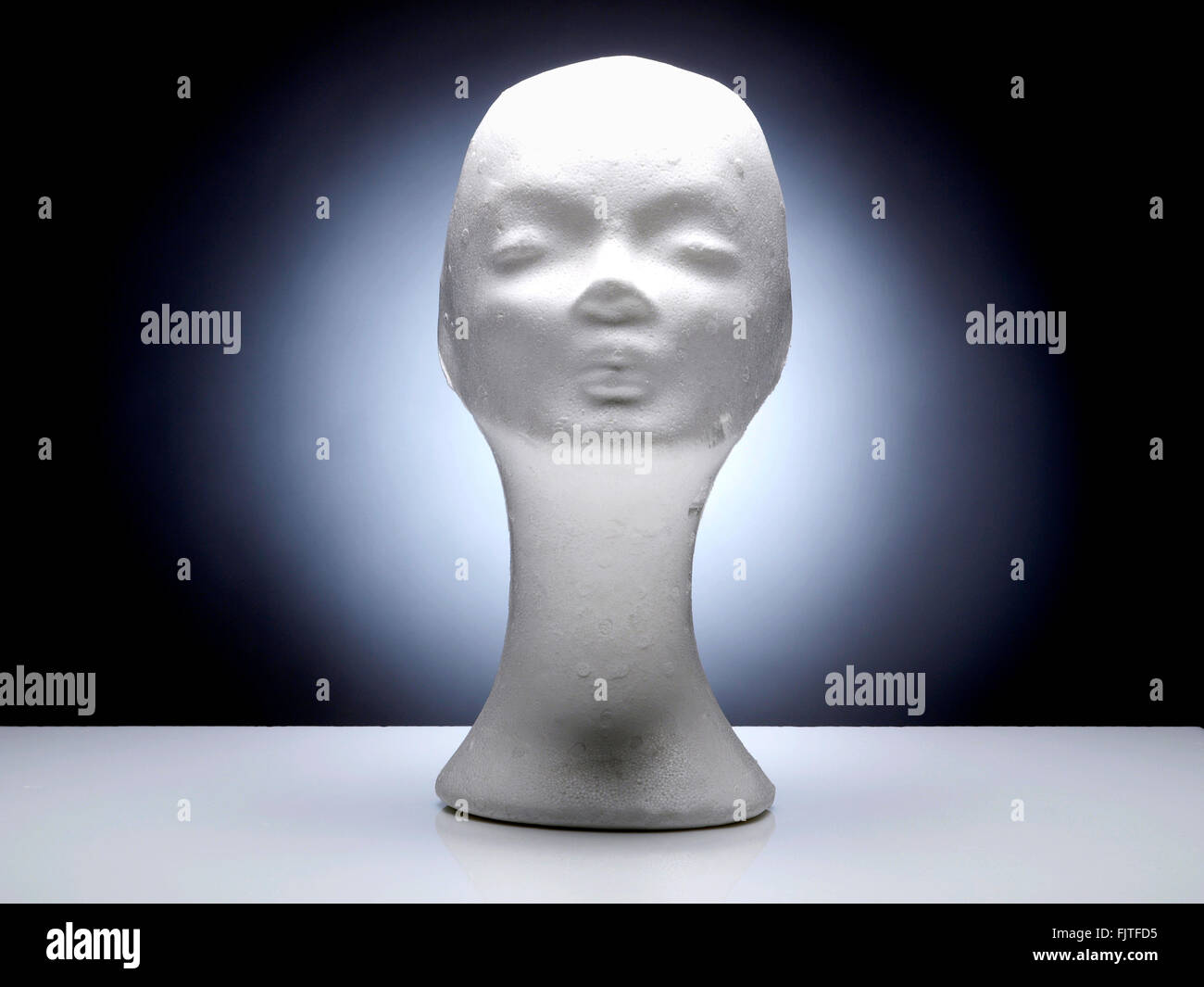 White dummy female head on black background Stock Photo - Alamy