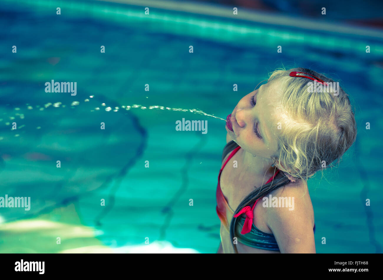 Mouth spitting water hi-res stock photography and images - Alamy