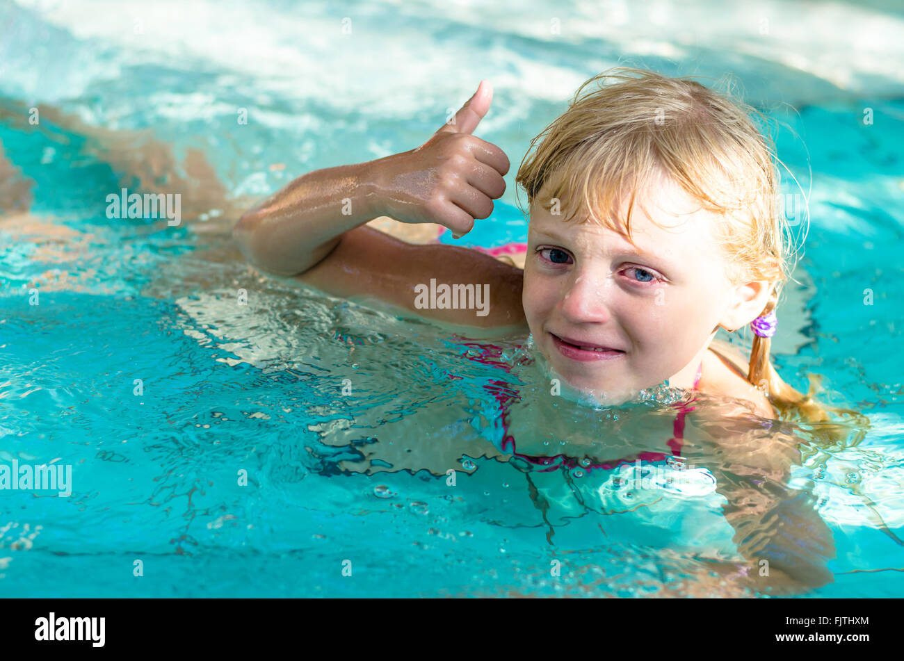 Thumb up in swimming pool hi-res stock photography and images - Alamy