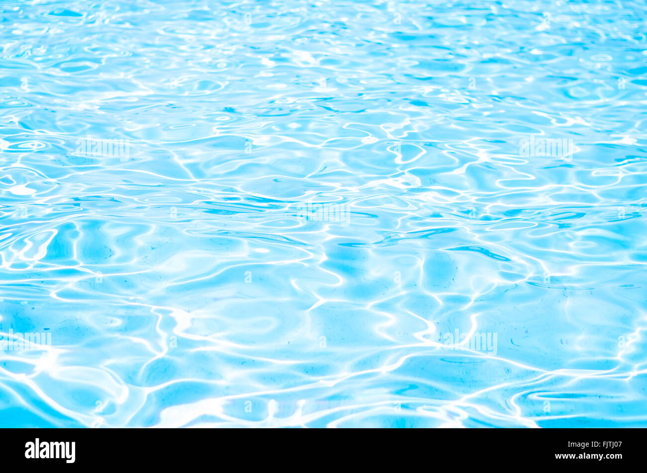 bright blue waved water surface in the swimming pool Stock Photo - Alamy