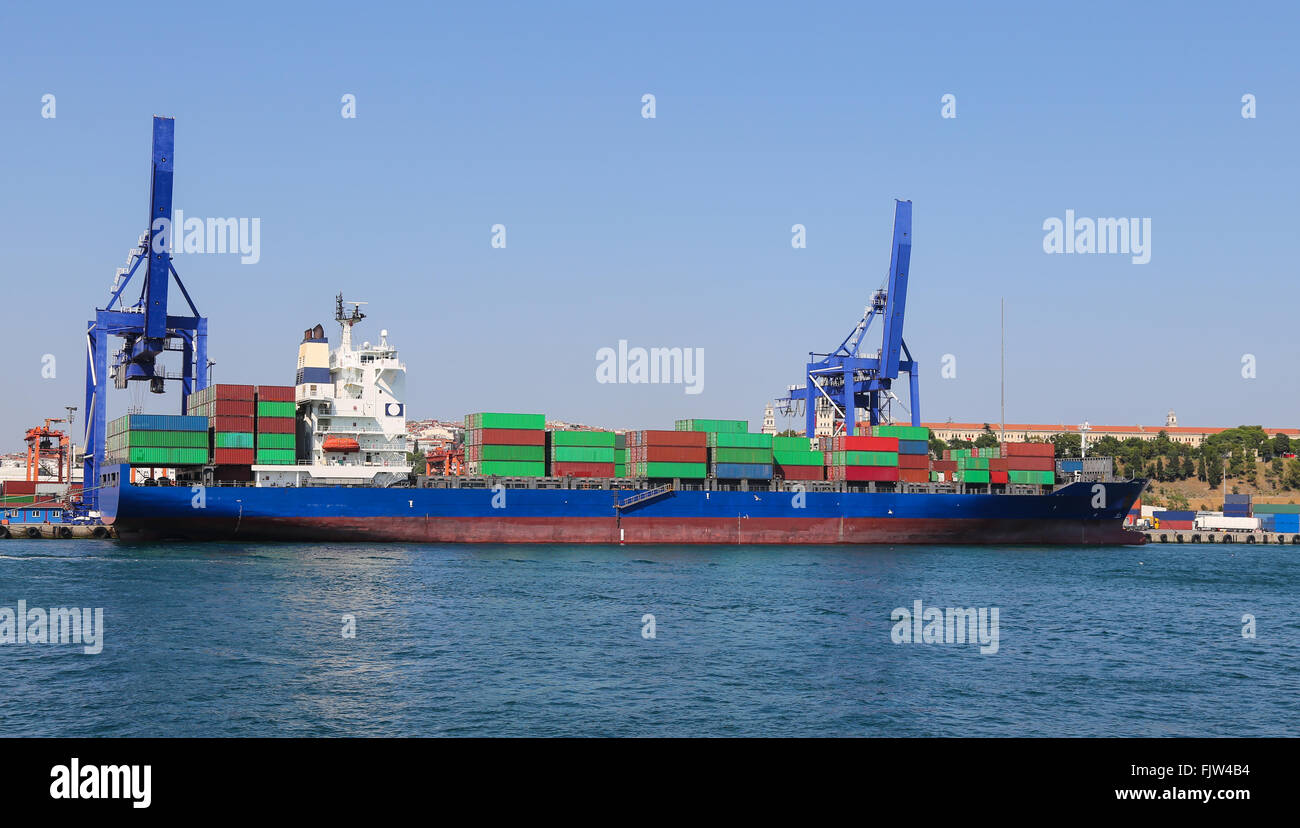 Container Ship is loading in a port Stock Photo - Alamy