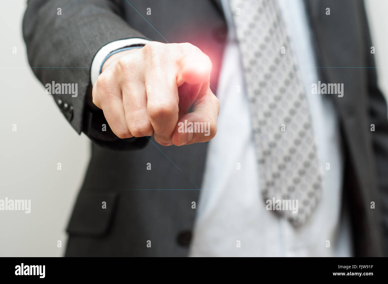 Business man with finger pointing to something or touching a touch ...