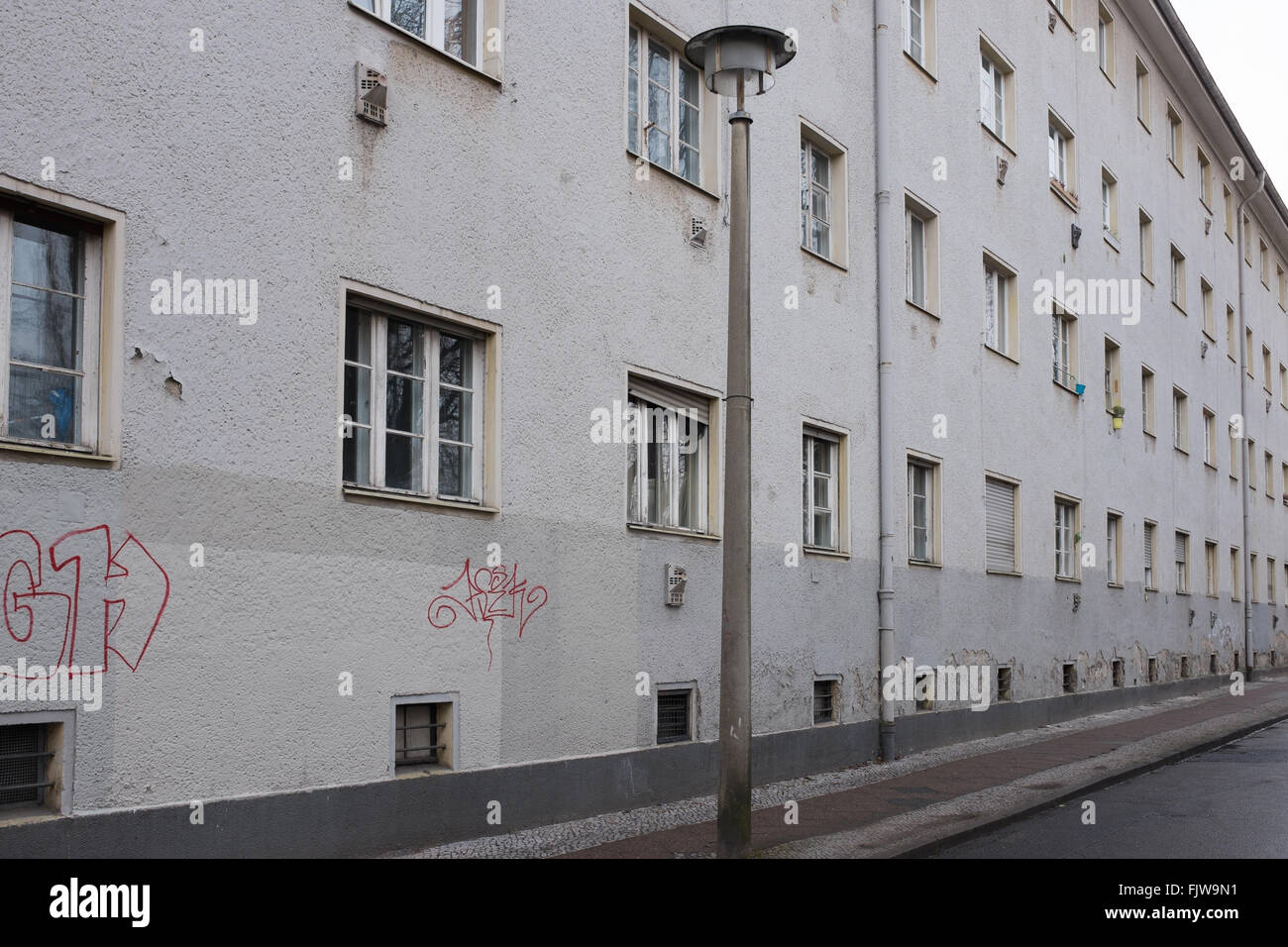 BERLIN, MARCH 02: An original DDR building and streetlight in Berlin ...