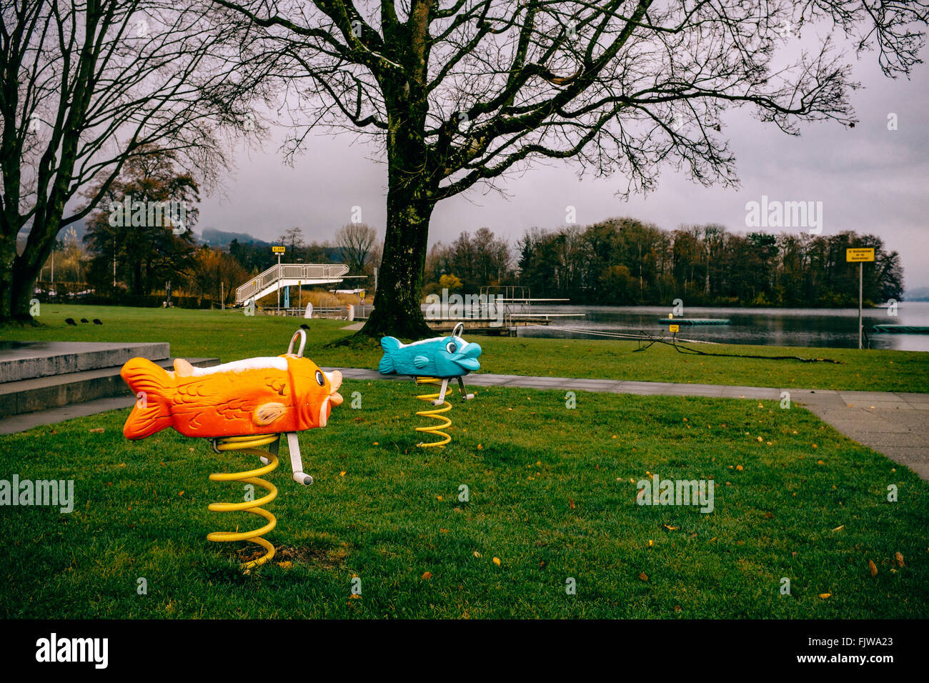 Spring seats in playground childhood hi-res stock photography and ...