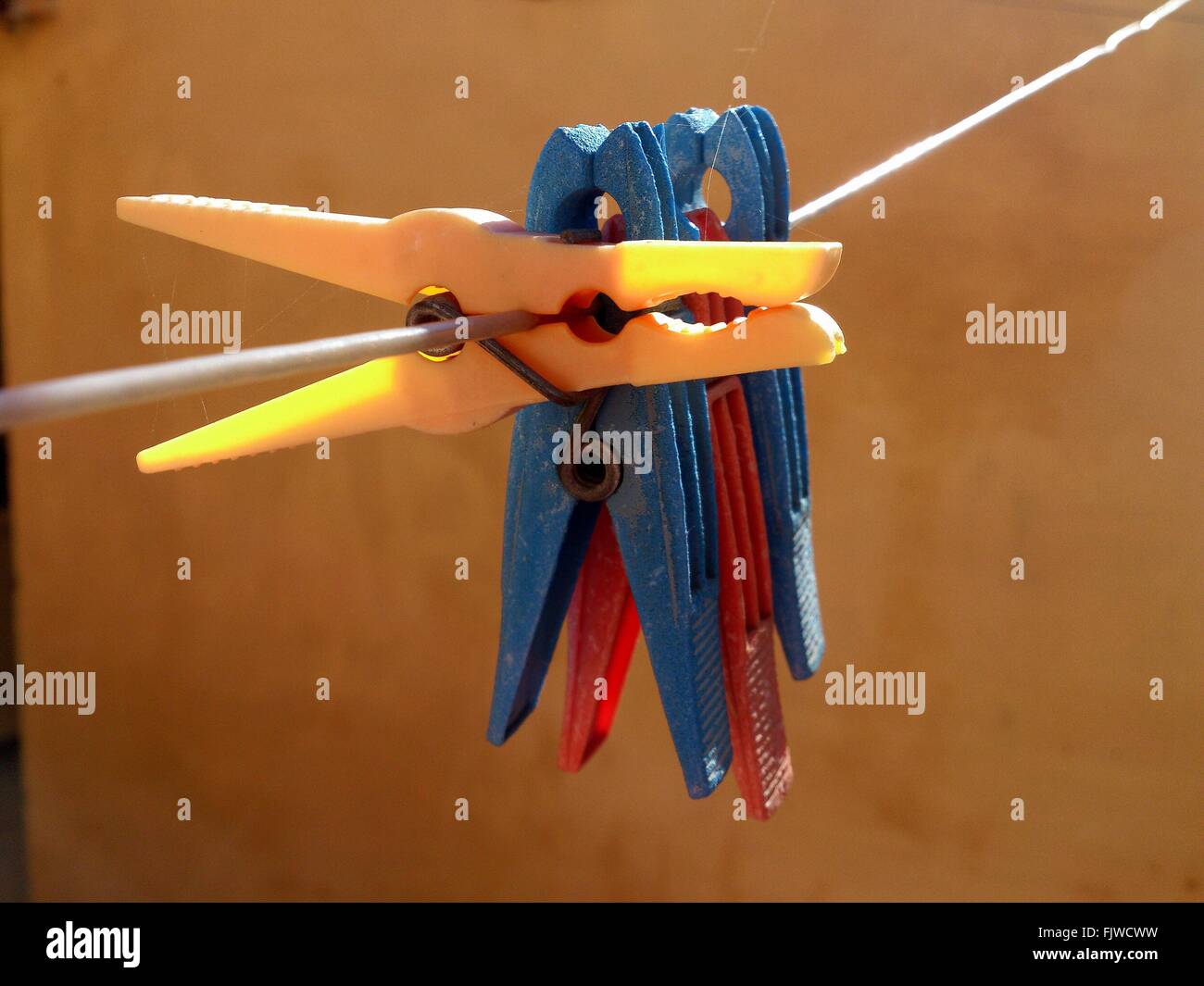 Pegs on string hi-res stock photography and images - Alamy