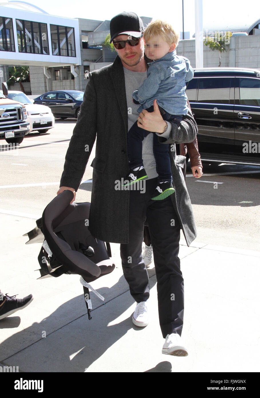 Ginnifer Goodwin, husband Josh Dallas, and their son Oliver arrive at ...