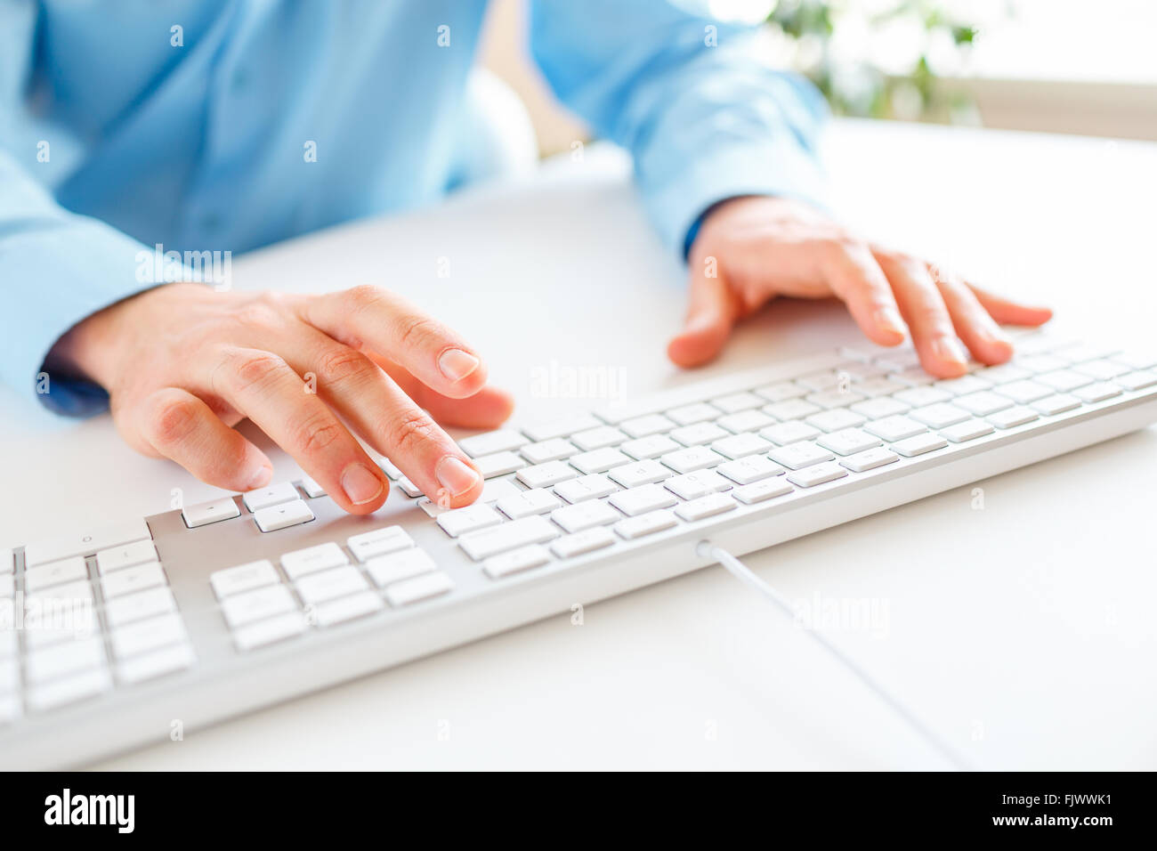 Male hands or men office worker typing on the keyboard Stock Photo - Alamy
