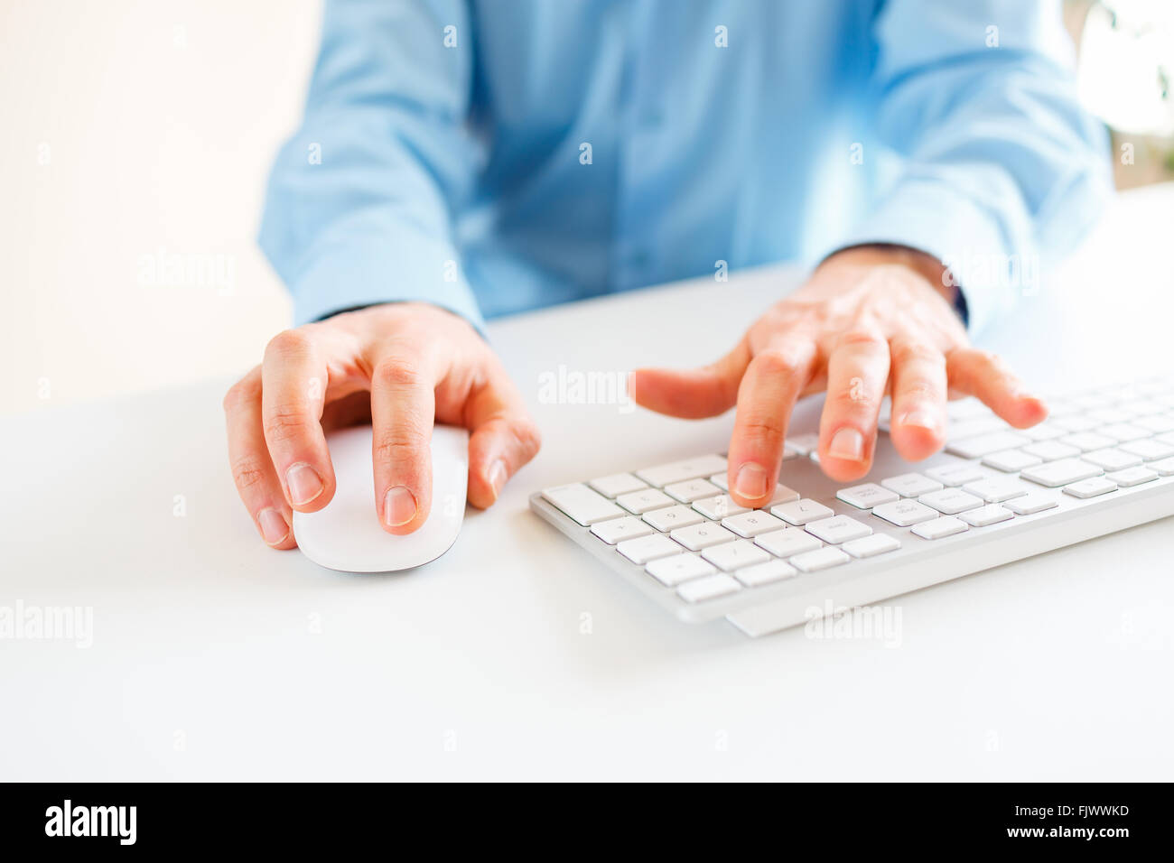 Male hands or men office worker typing on the keyboard Stock Photo - Alamy