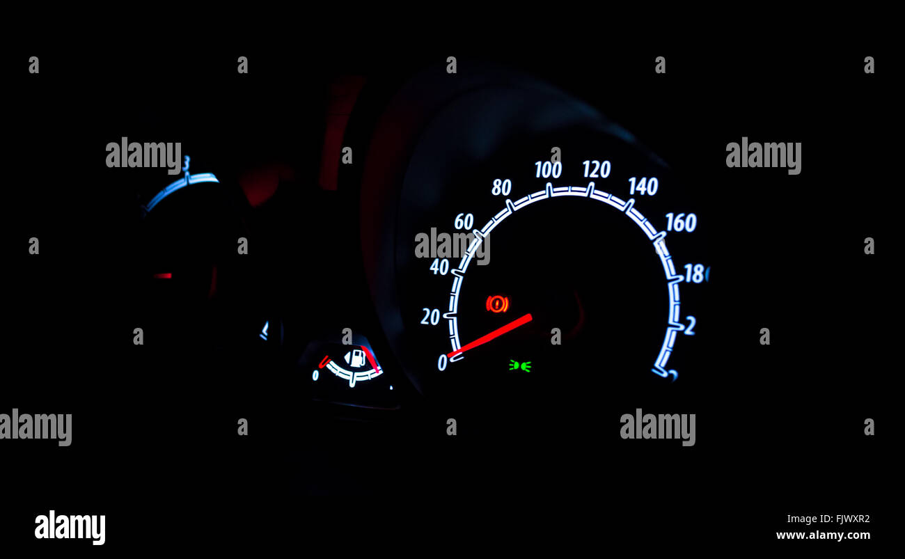 Speedometer illuminated at night close up Stock Photo - Alamy