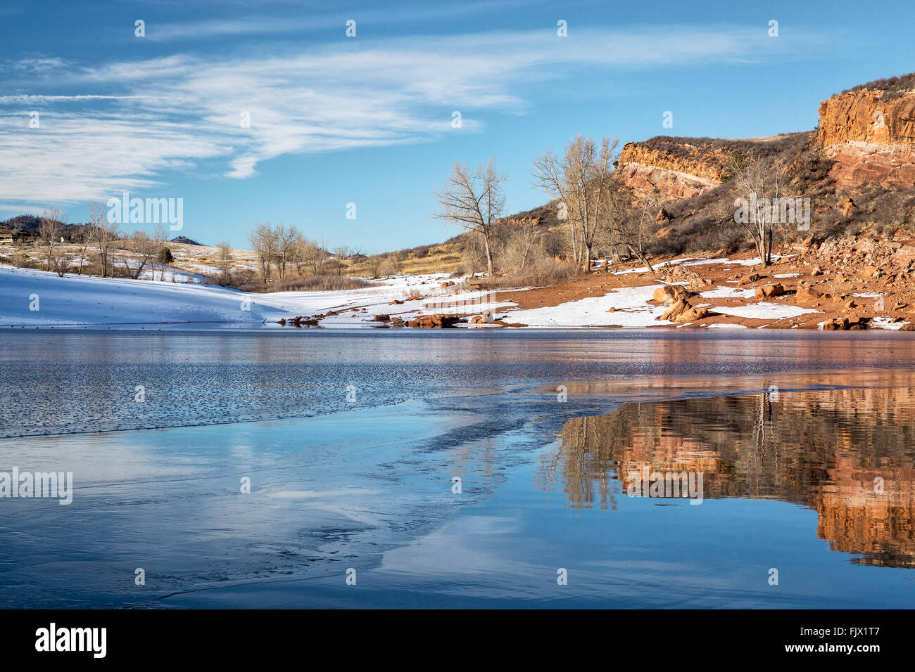 sandstone cliff over Horsetooth Reservoir and Lory State Park at winter ...