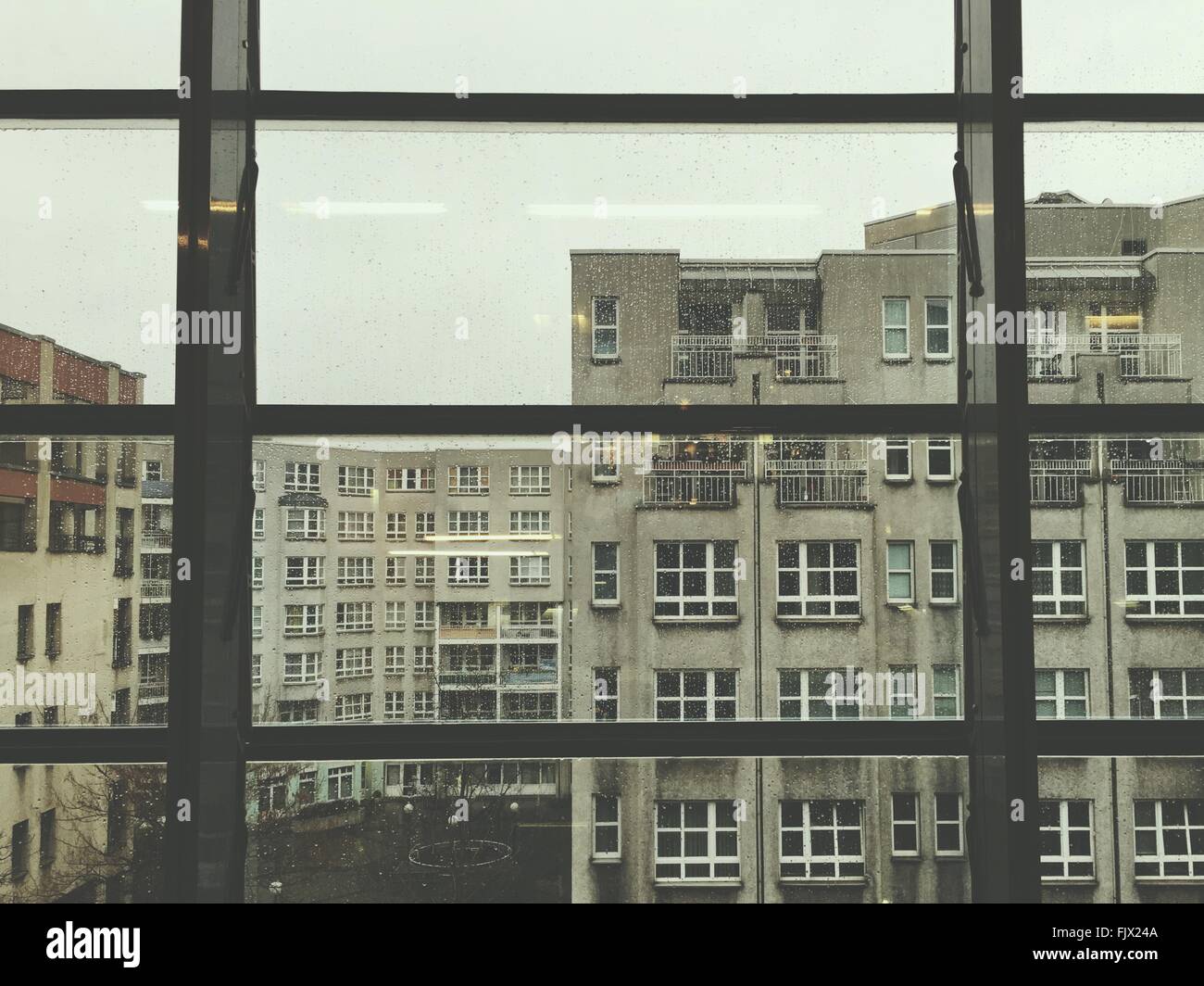 Buildings Seen Through Apartment Window Stock Photo - Alamy