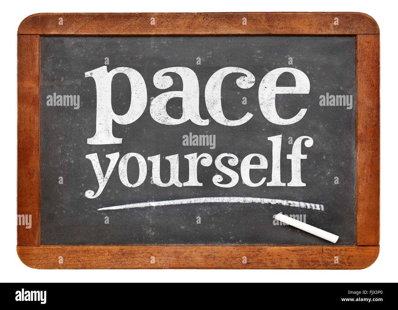 pace yourself advice on a vintage slate blackboard Stock Photo - Alamy