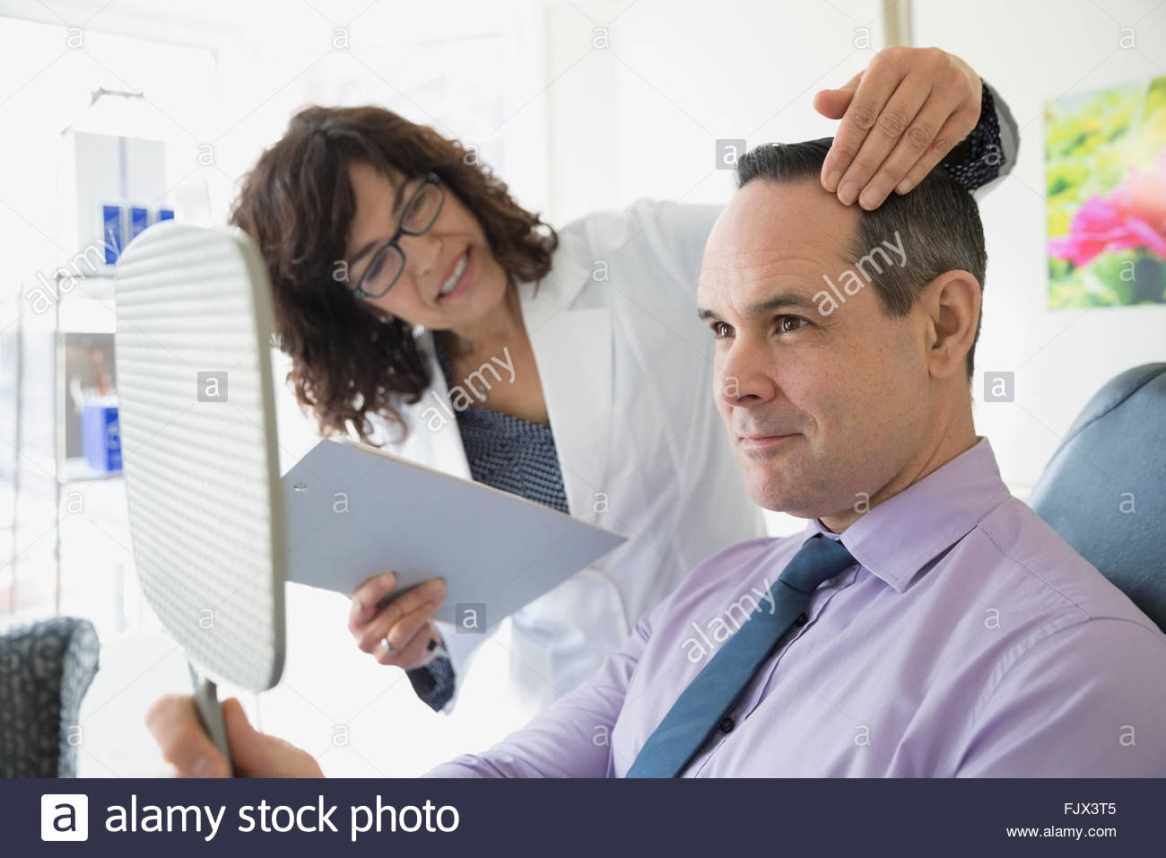 Man body checking mirror hi-res stock photography and images - Alamy