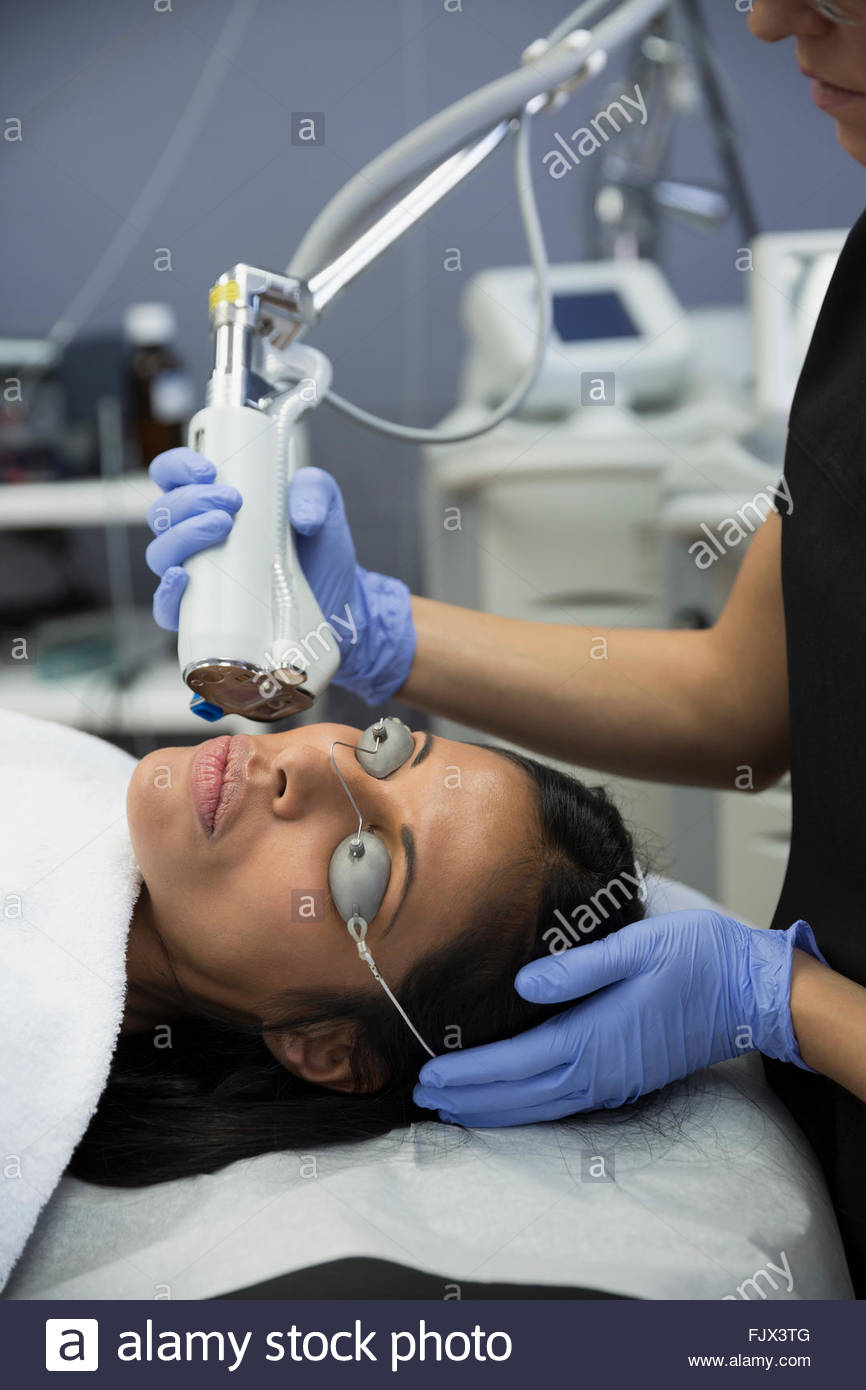 Woman laser body hi-res stock photography and images - Alamy