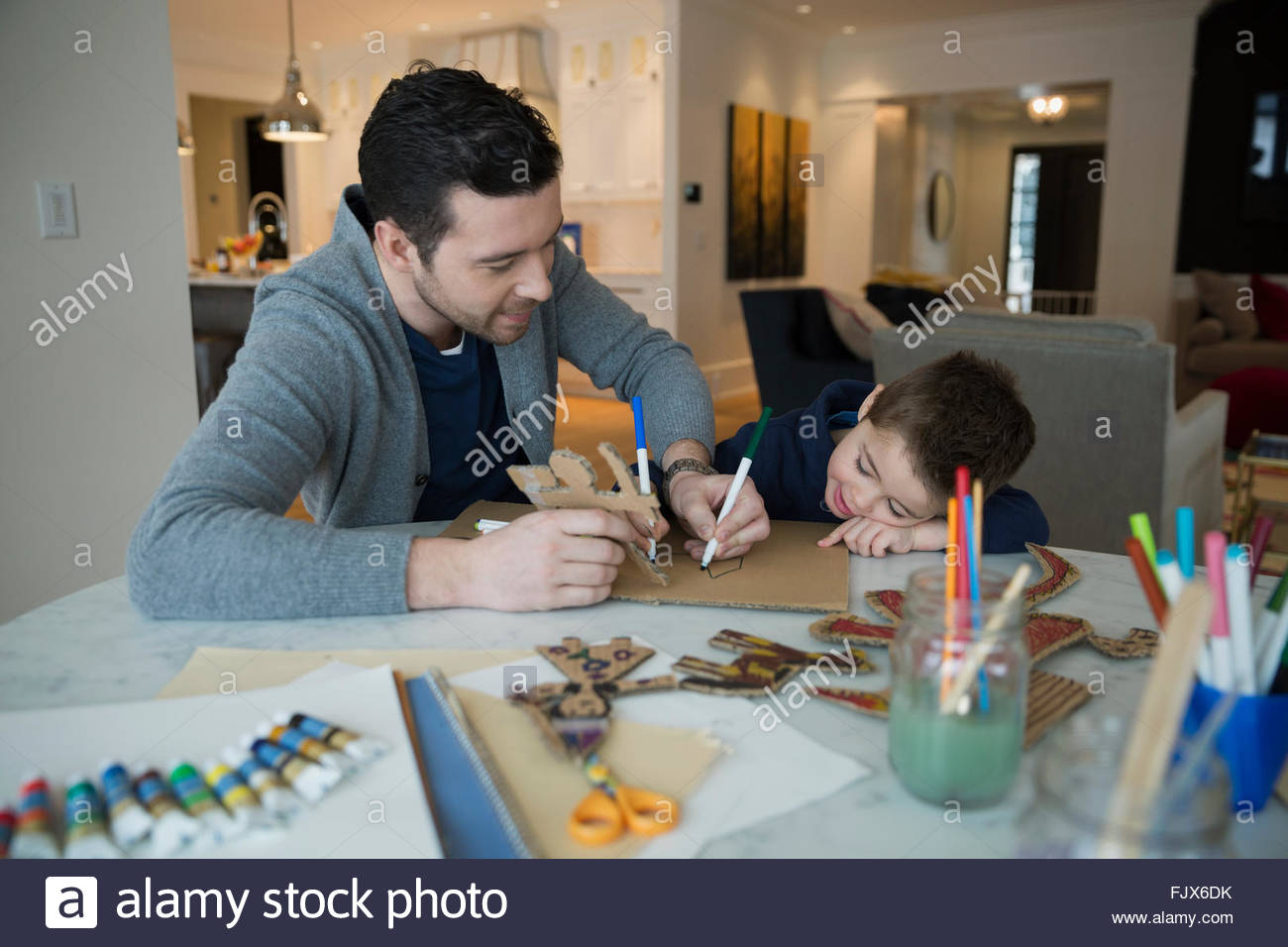 Boy coloring markers hi-res stock photography and images - Alamy