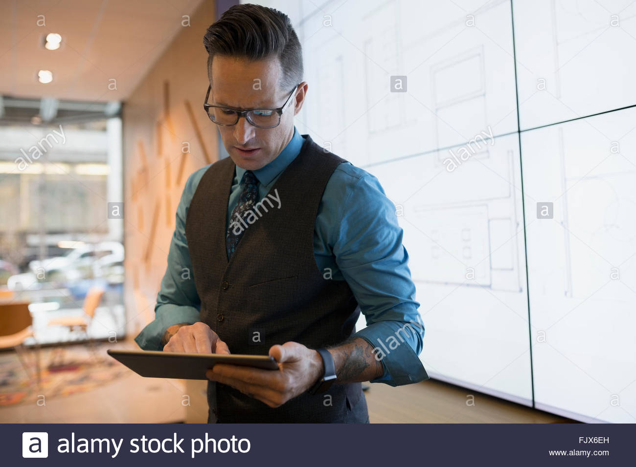 Architect using digital tablet at projection screen Stock Photo - Alamy Architect using digital tablet at projection screen Stock Photo - Alamy