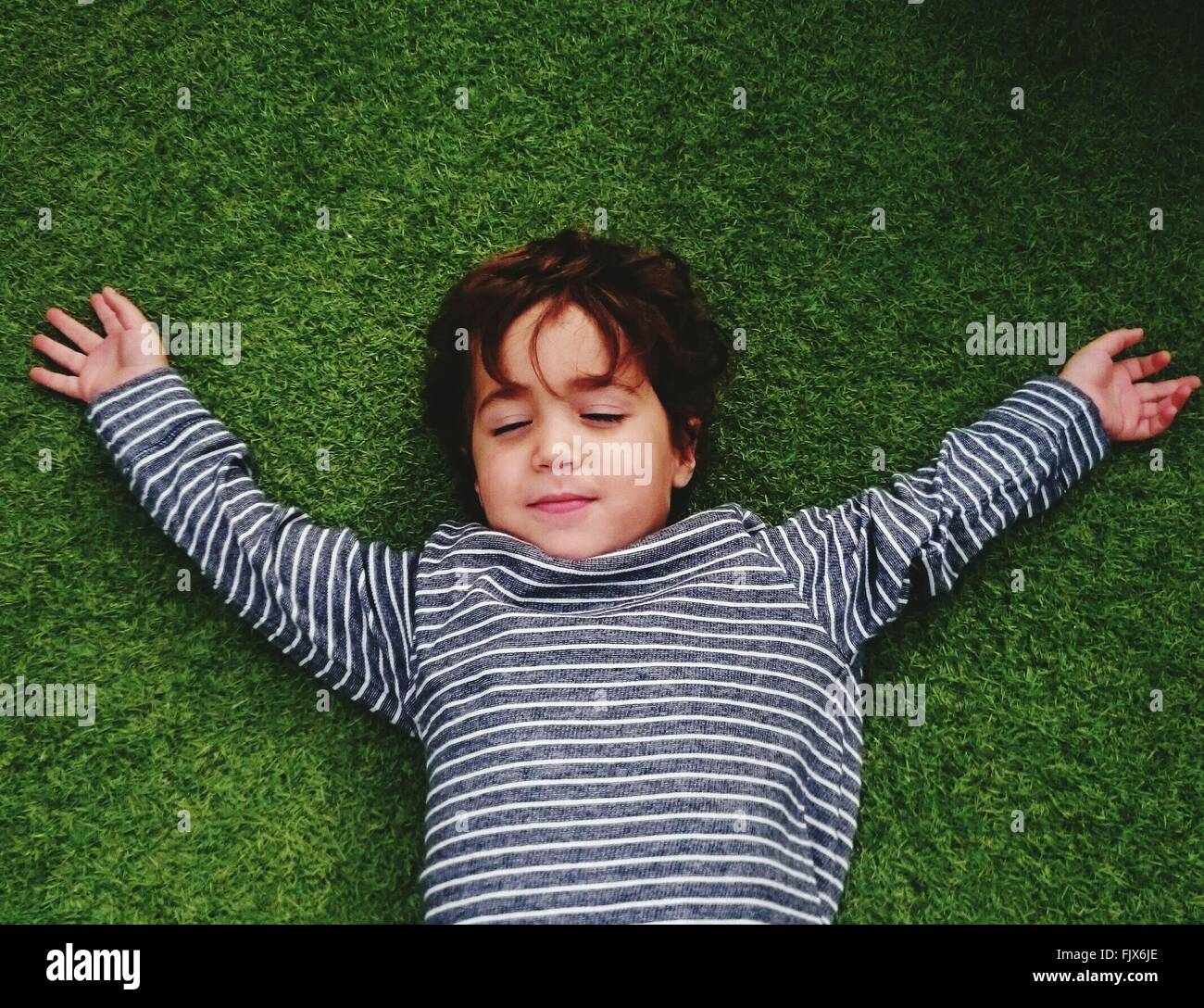 Boys resting hi-res stock photography and images - Alamy