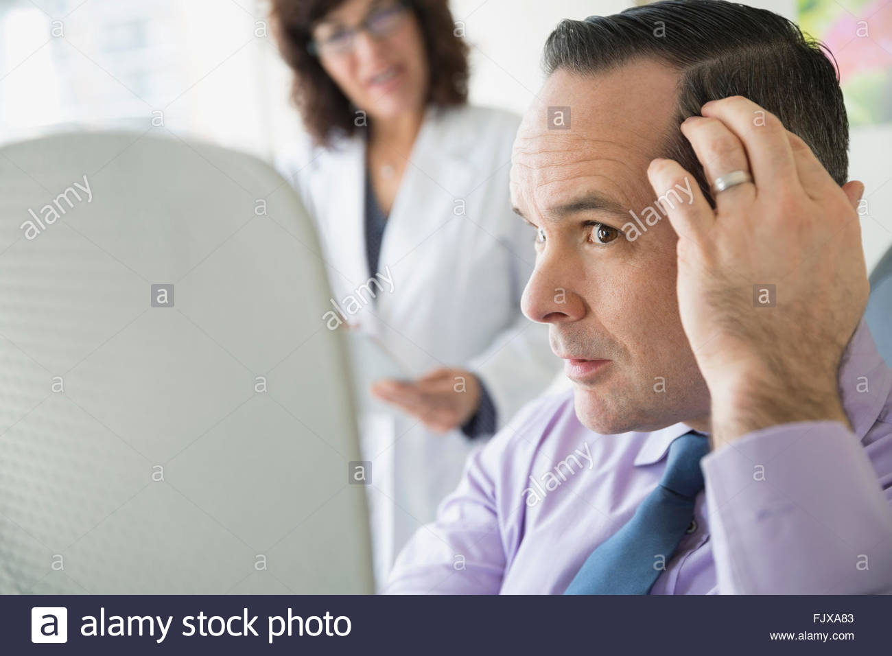 Man body checking mirror hi-res stock photography and images - Alamy