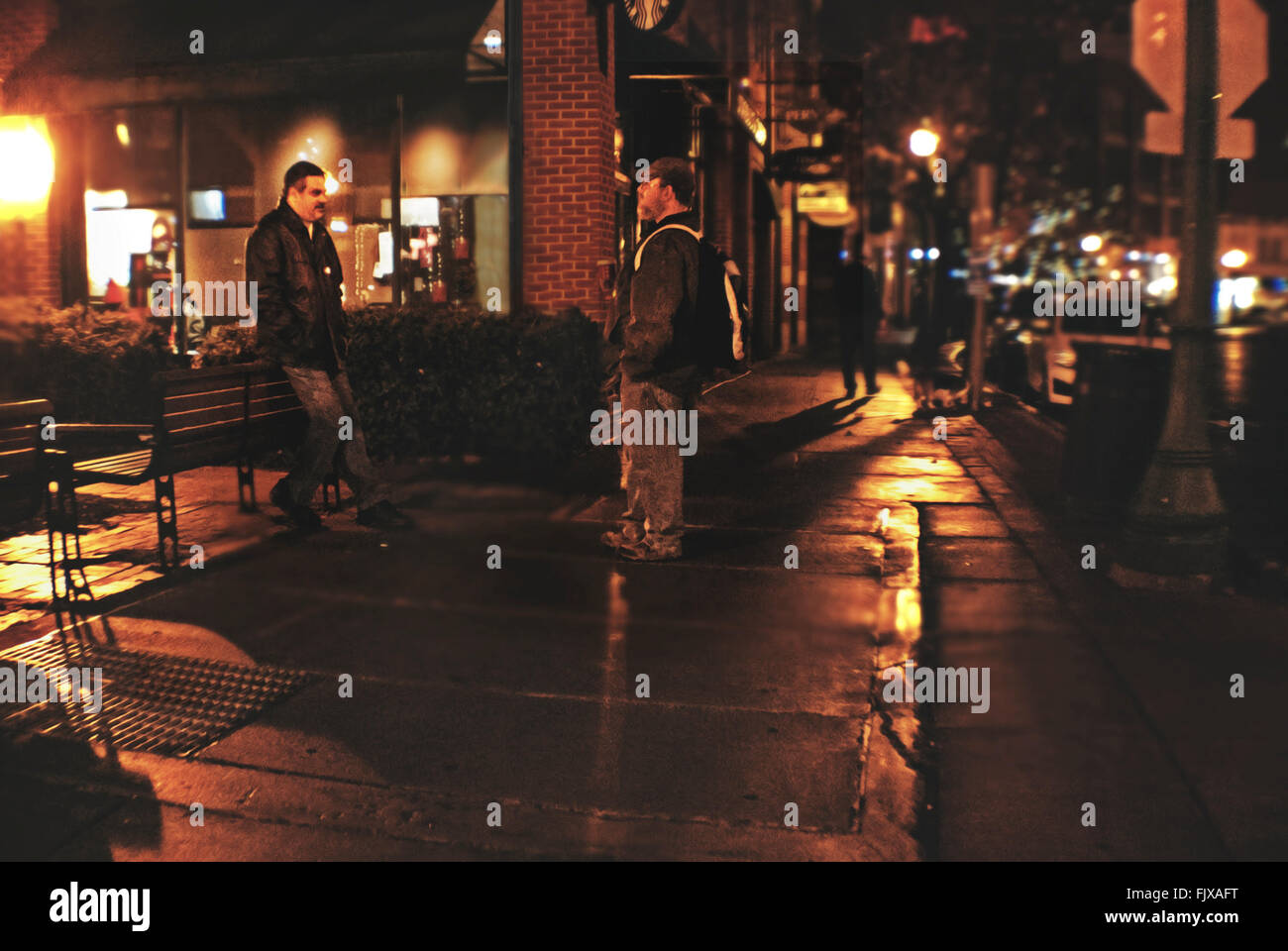 People talking outside at night hi-res stock photography and images - Alamy