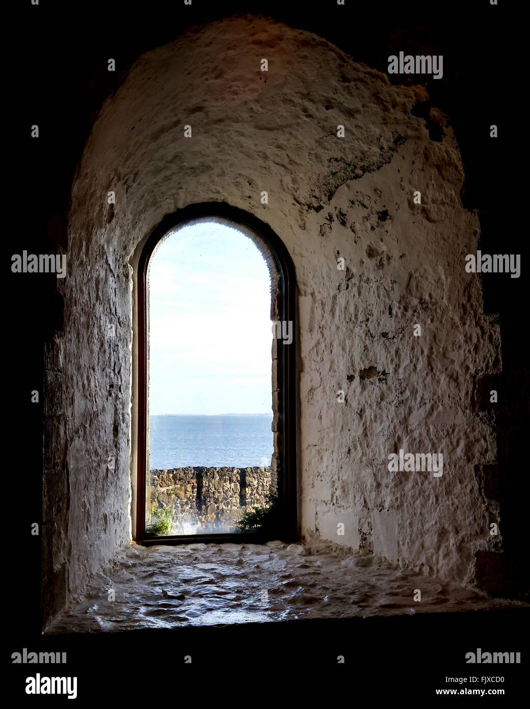 Sea Seen Through Arch Window Stock Photo - Alamy