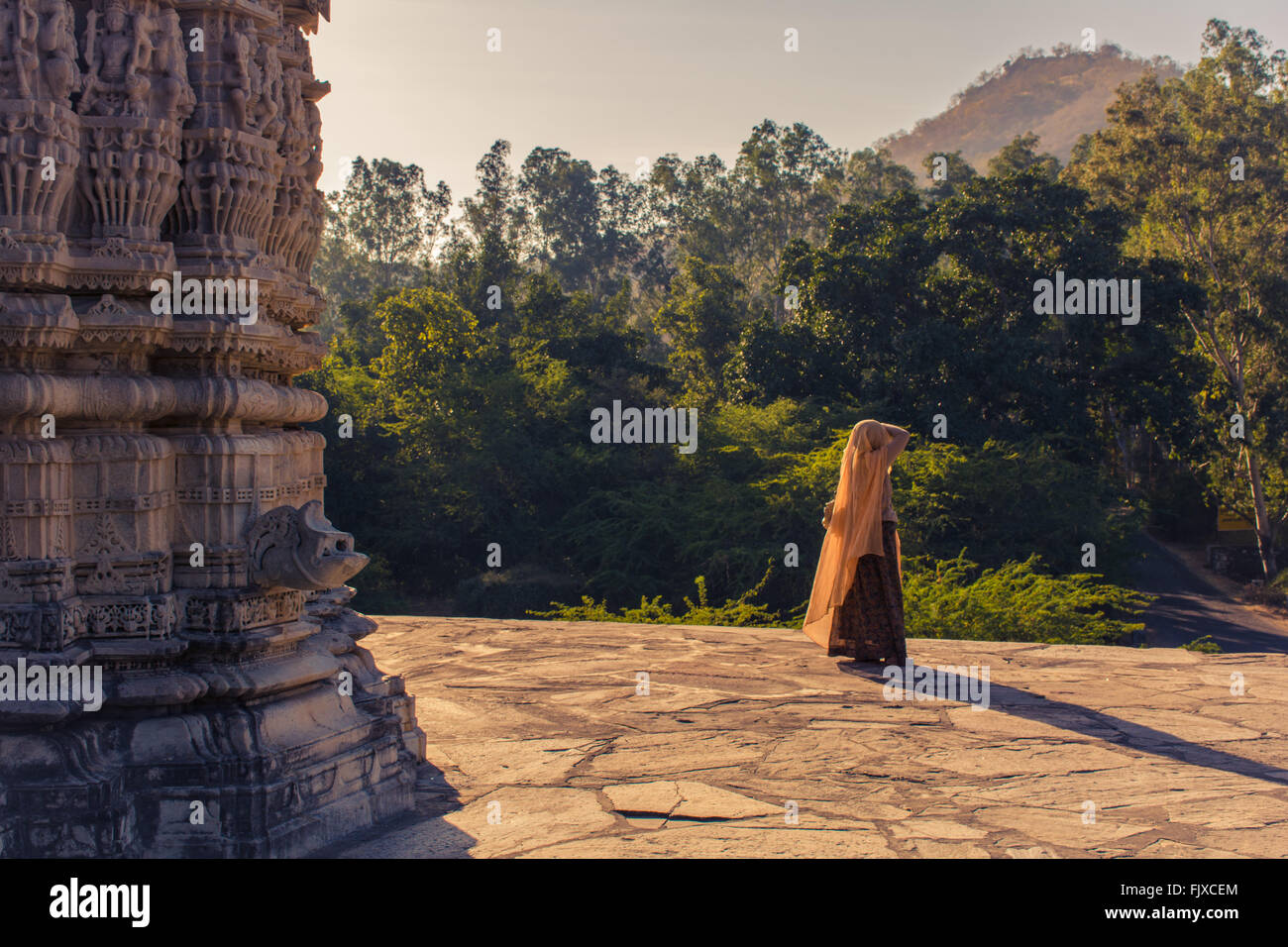 Woman in temple hi-res stock photography and images - Alamy