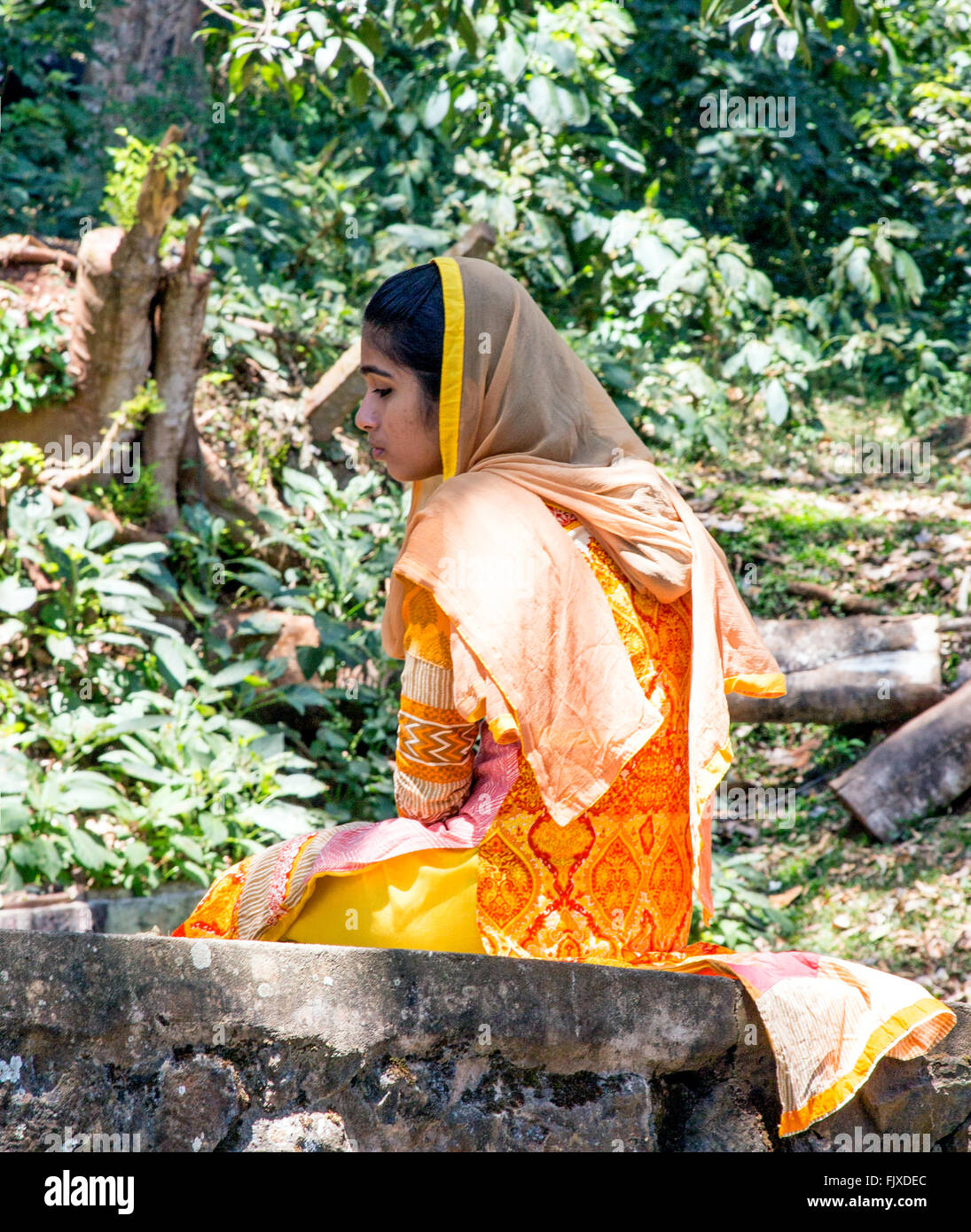 Woman sitting indian style hi-res stock photography and images - Alamy