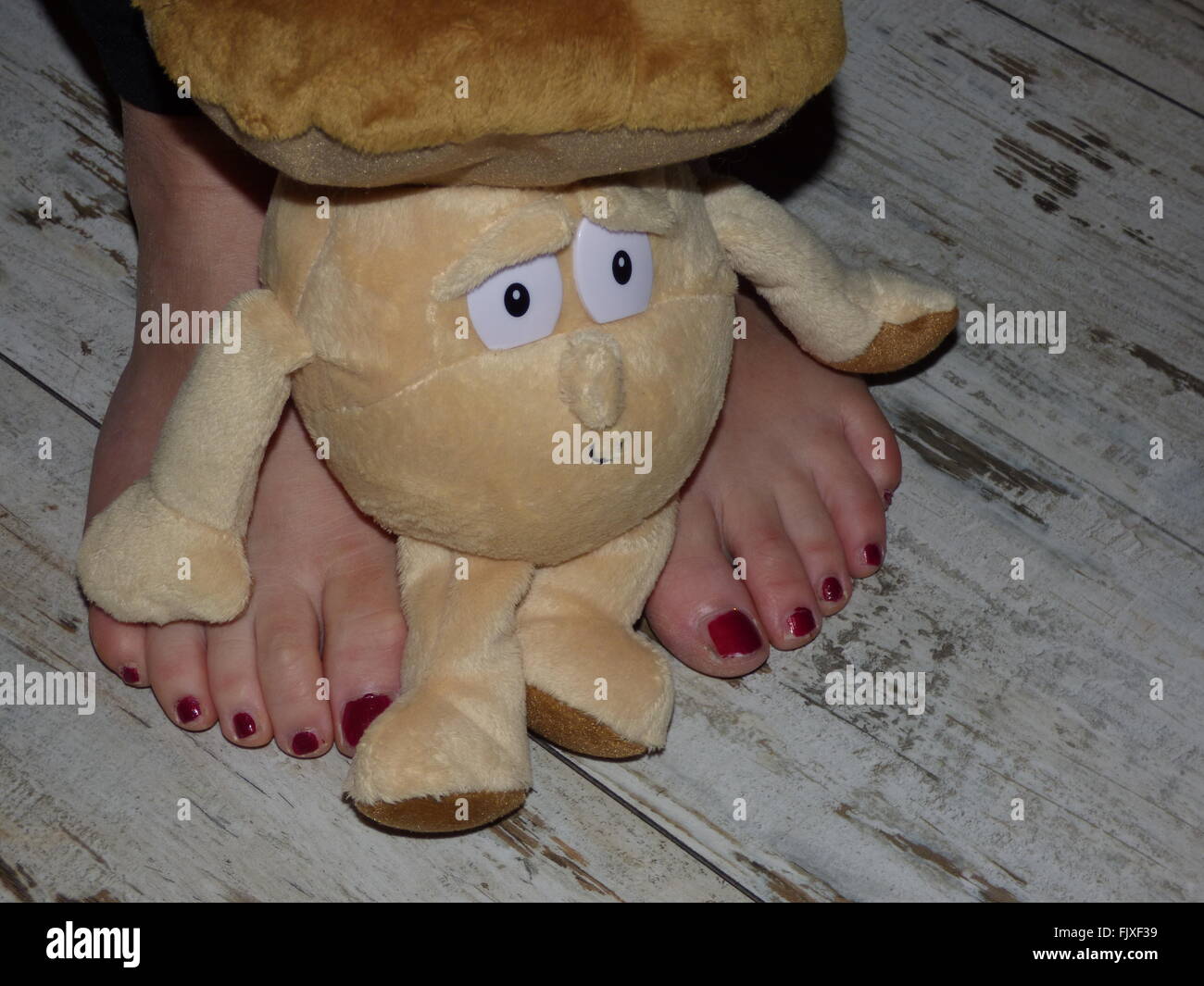 Woman stuffed toy barefoot hi-res stock photography and images - Alamy