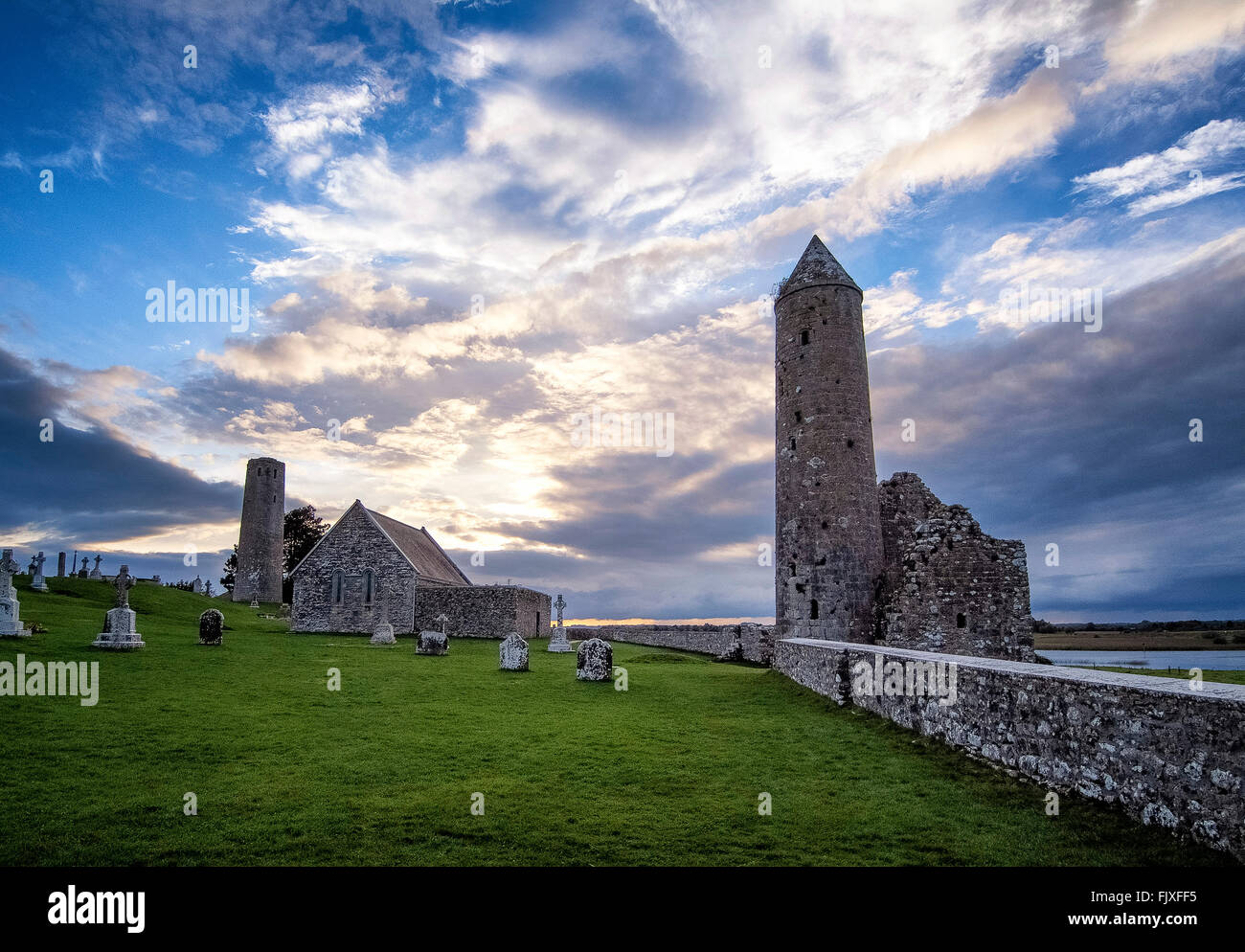 Clonmacnoise Monastery shannon Offaly Ireland round tower dusk sunset ...