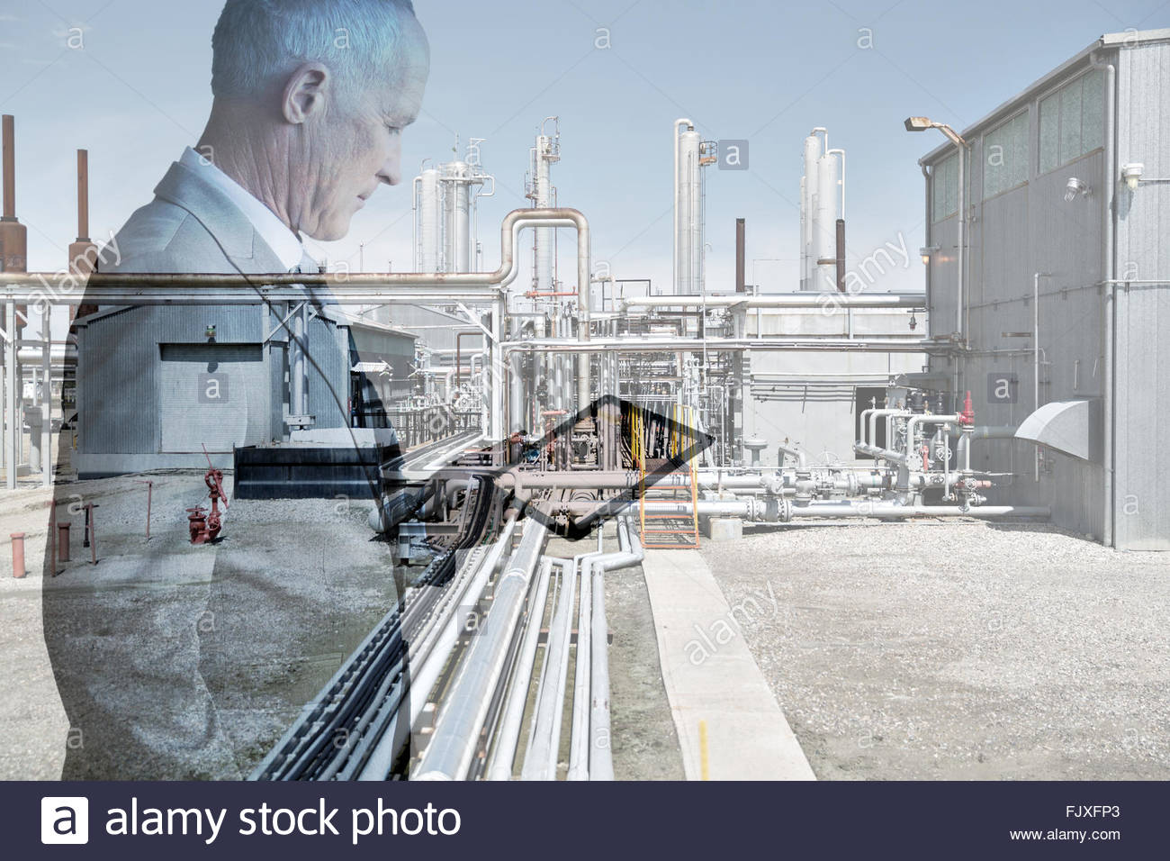 Digital composite businessman using digital tablet at factory Stock ... Digital composite businessman using digital tablet at factory Stock ...