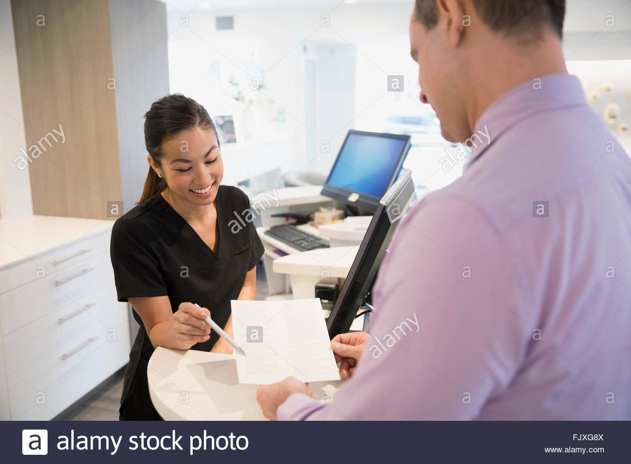 Doctors Receptionist Stock Photos & Doctors Receptionist Stock Images ...