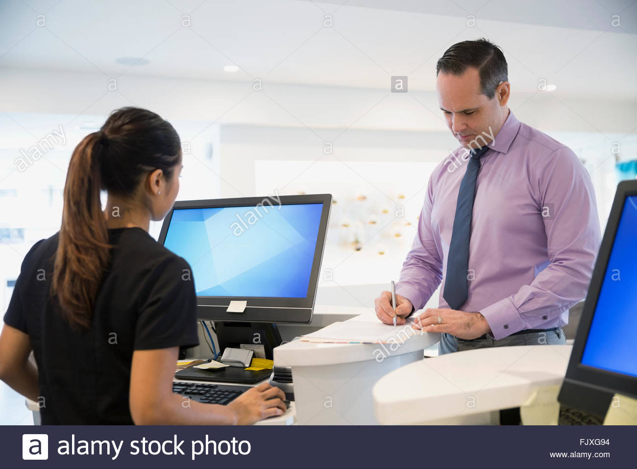 Business man arriving office desk hi-res stock photography and images ...