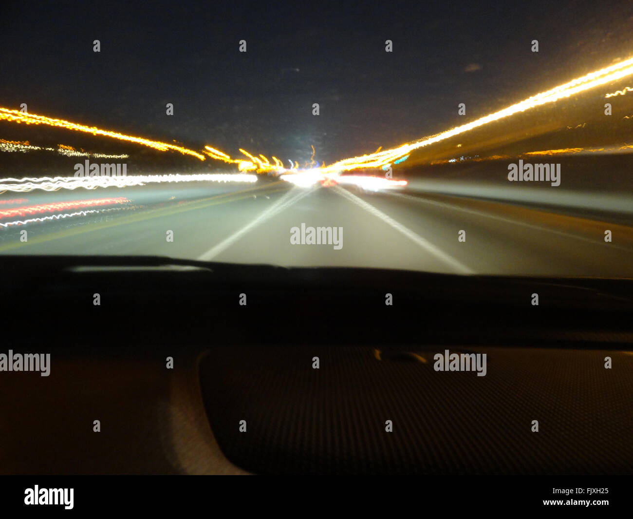 San Jose highway, California, USA, night view with beautiful beams of ...