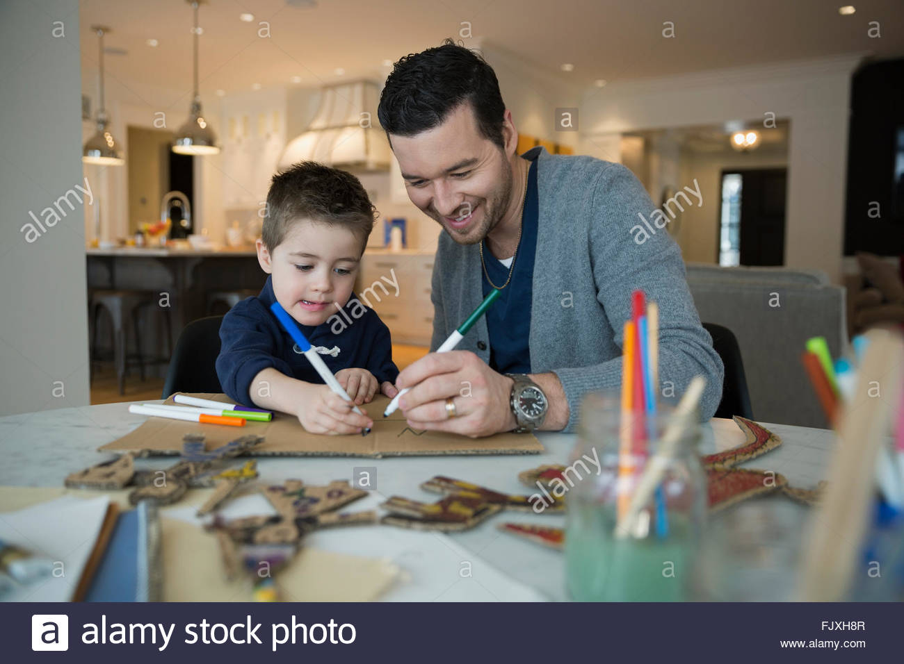 Boy coloring markers hi-res stock photography and images - Alamy