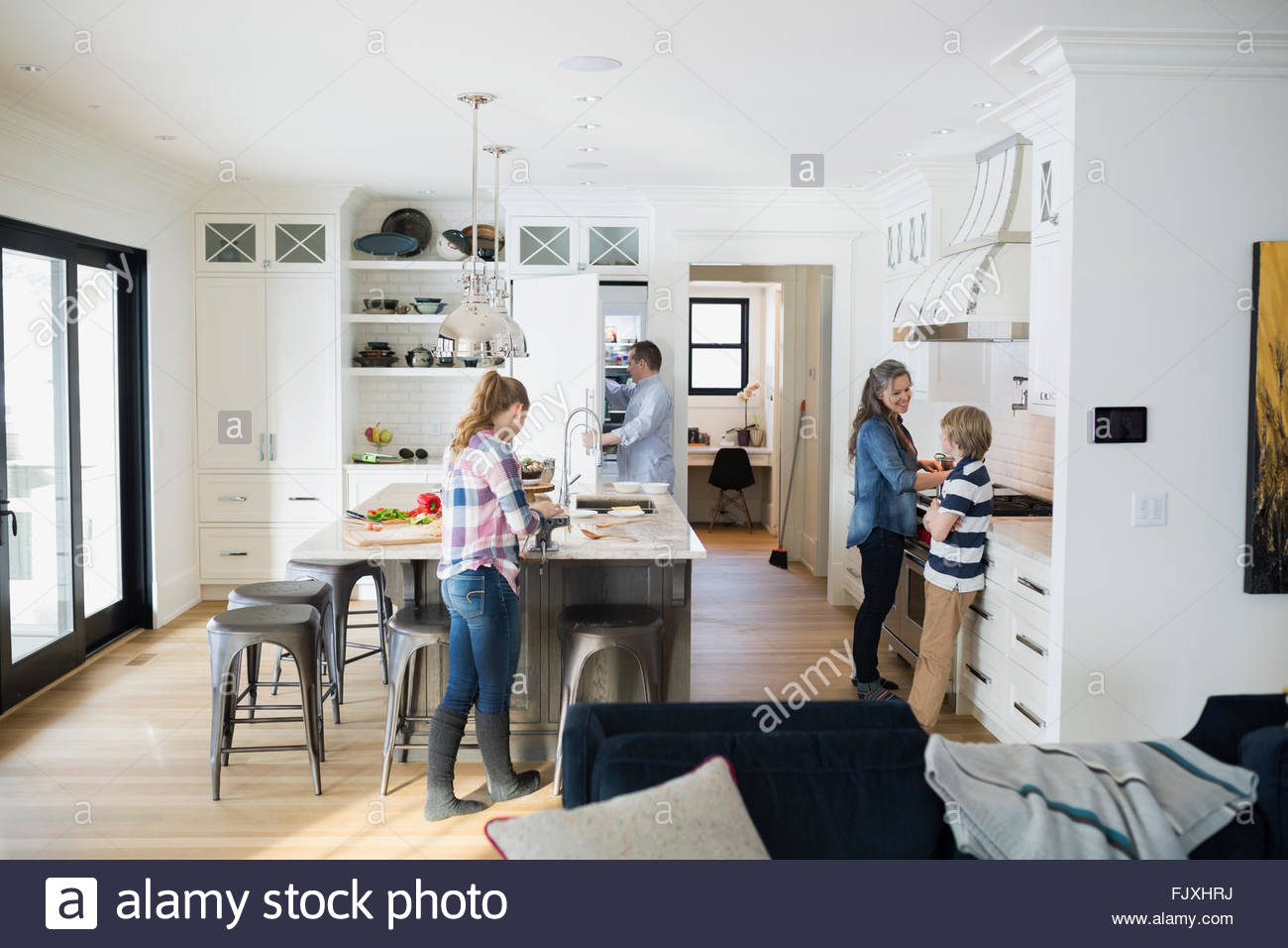 Father and teenage son talking kitchen High Resolution Stock ...