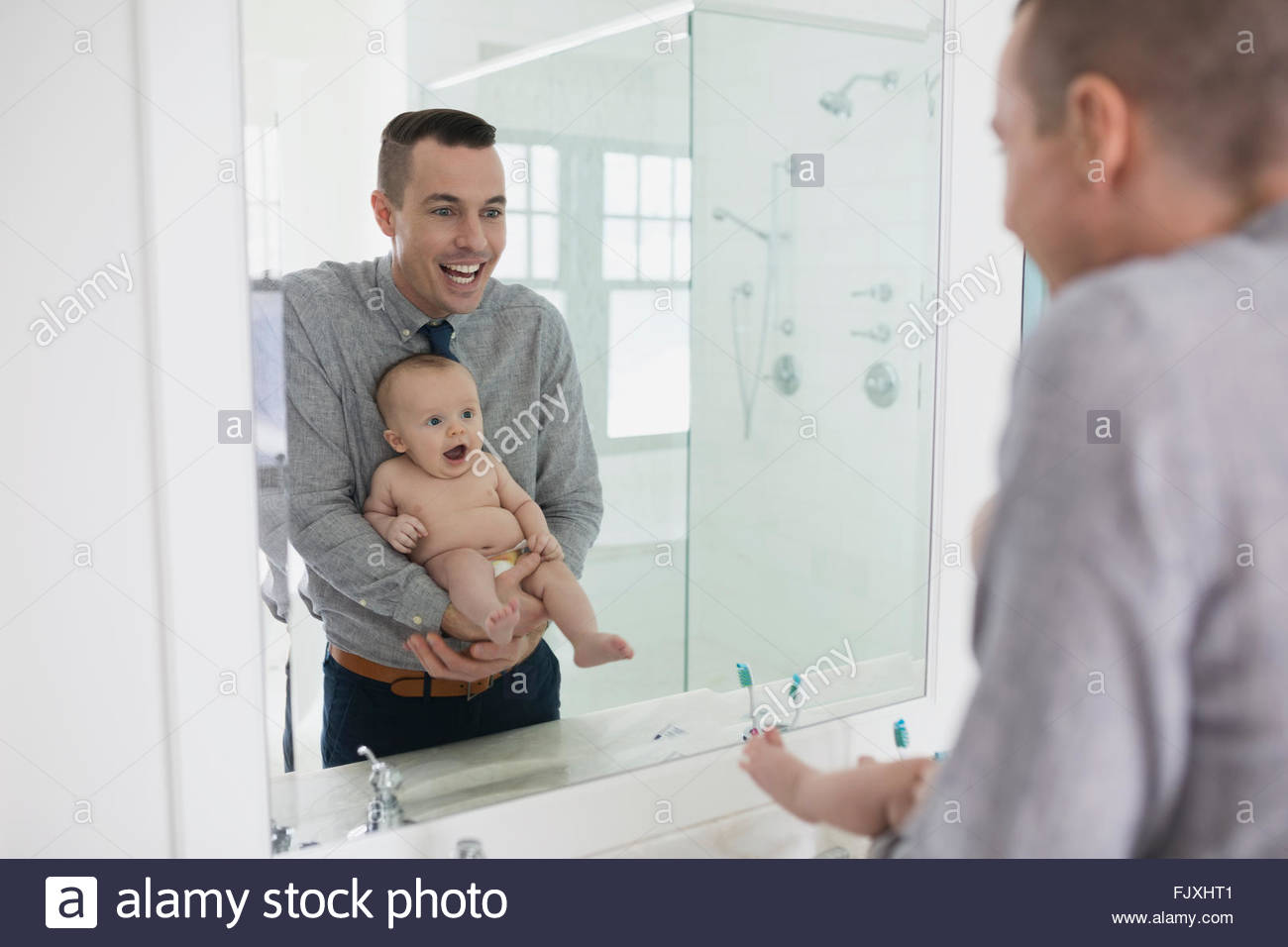 Child holding mirror reflection hi-res stock photography and images - Alamy