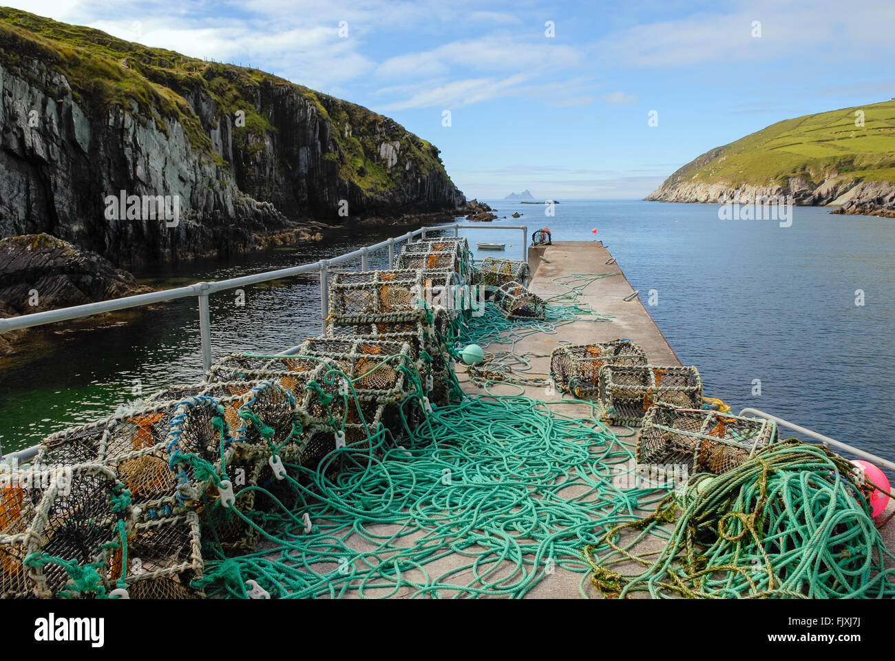 lobster trap baskets on a boat ramp in ireland Stock Photo - Alamy