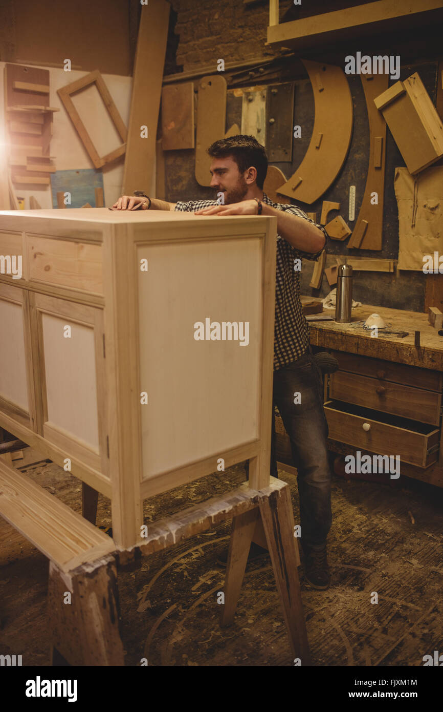 Carpenter working on his craft Stock Photo - Alamy