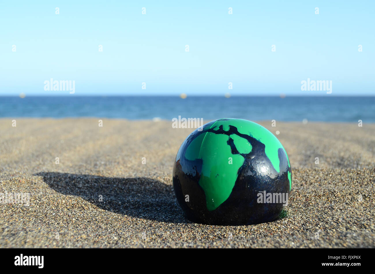 Globe Earth on the Beach Stock Photo - Alamy