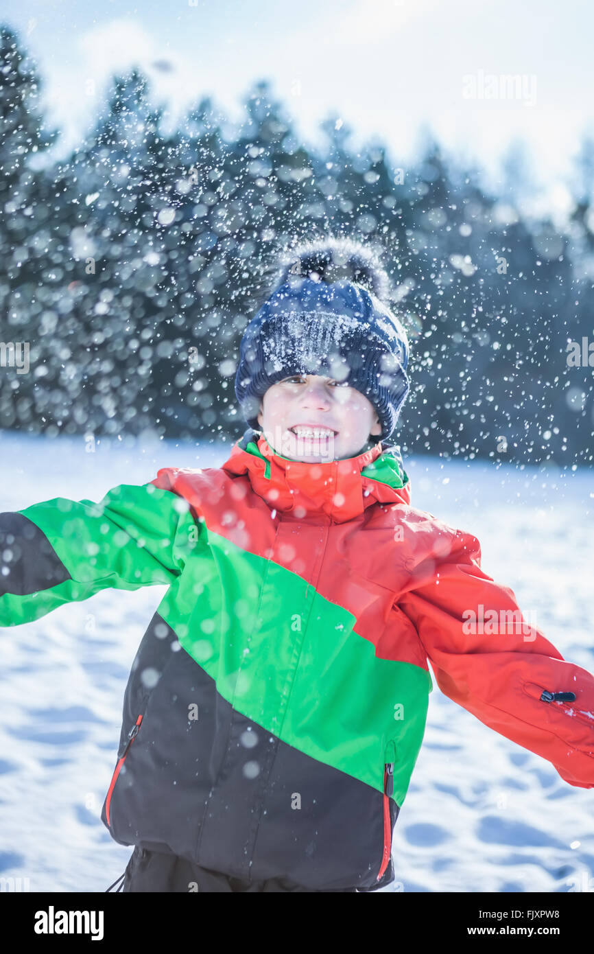 Portrait of cute boy in winter clothes Stock Photo - Alamy