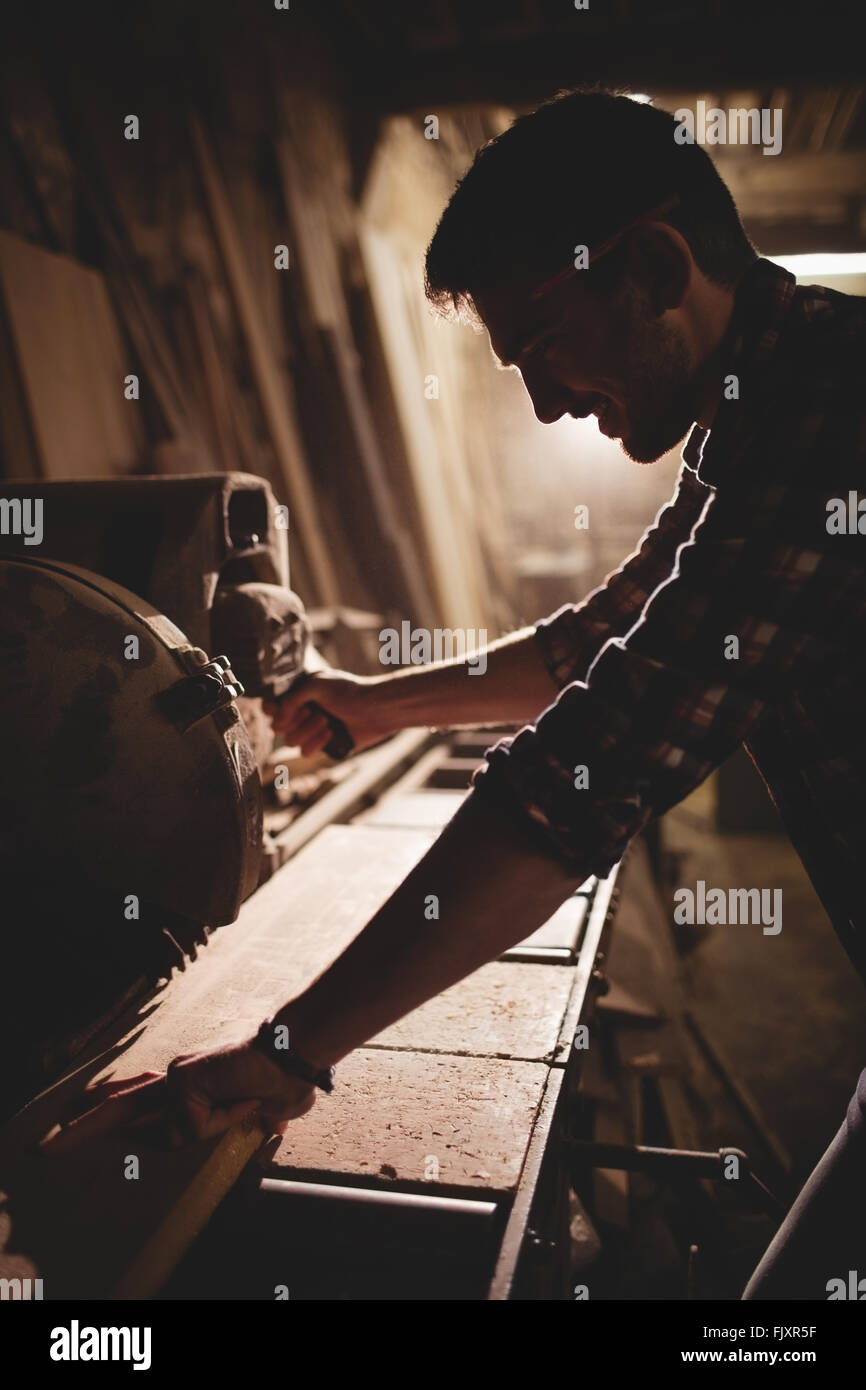Carpenter working on his craft Stock Photo - Alamy