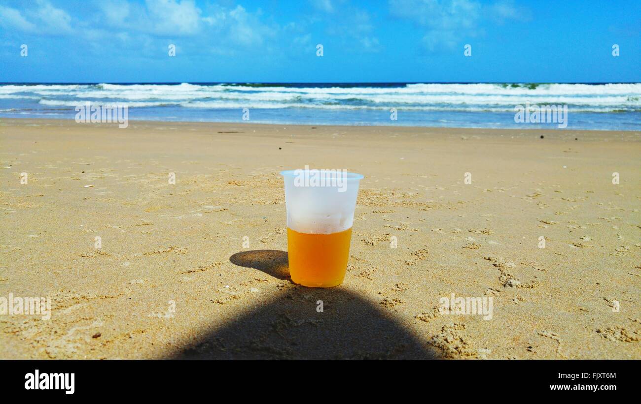 Beer in disposable glass sand beach beach hi-res stock photography and ...