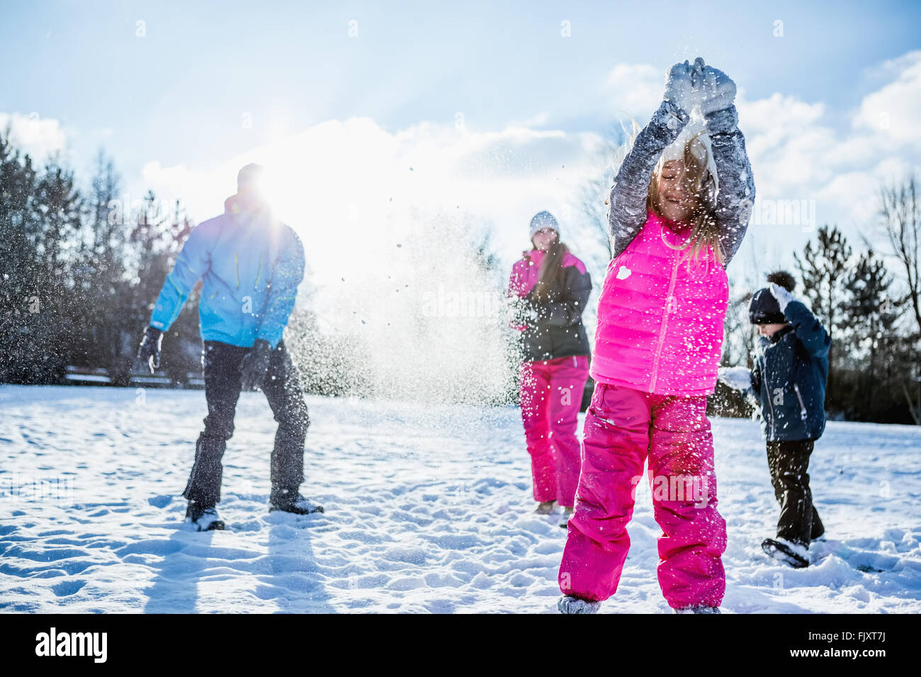 Snowball fight children hi-res stock photography and images - Alamy