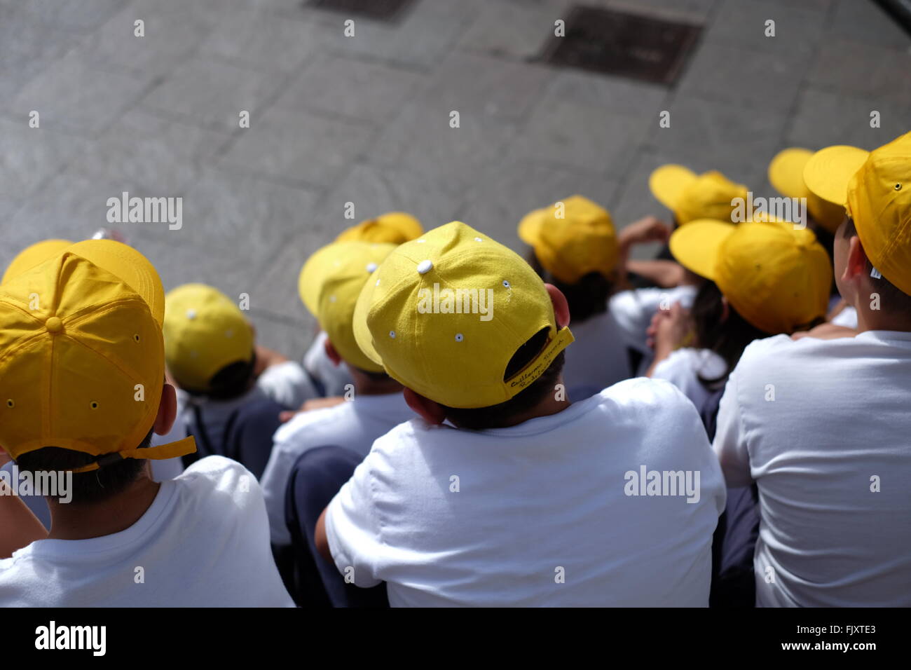 Children with caps on hi-res stock photography and images - Alamy