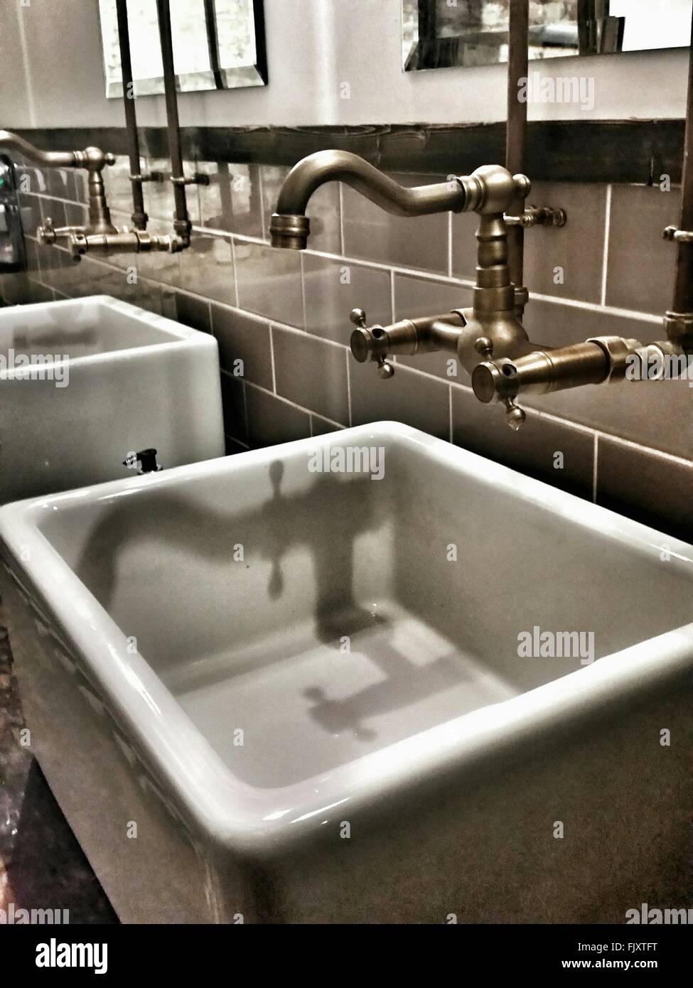 Empty Sinks In Public Restroom Bathroom High Resolution Stock ...