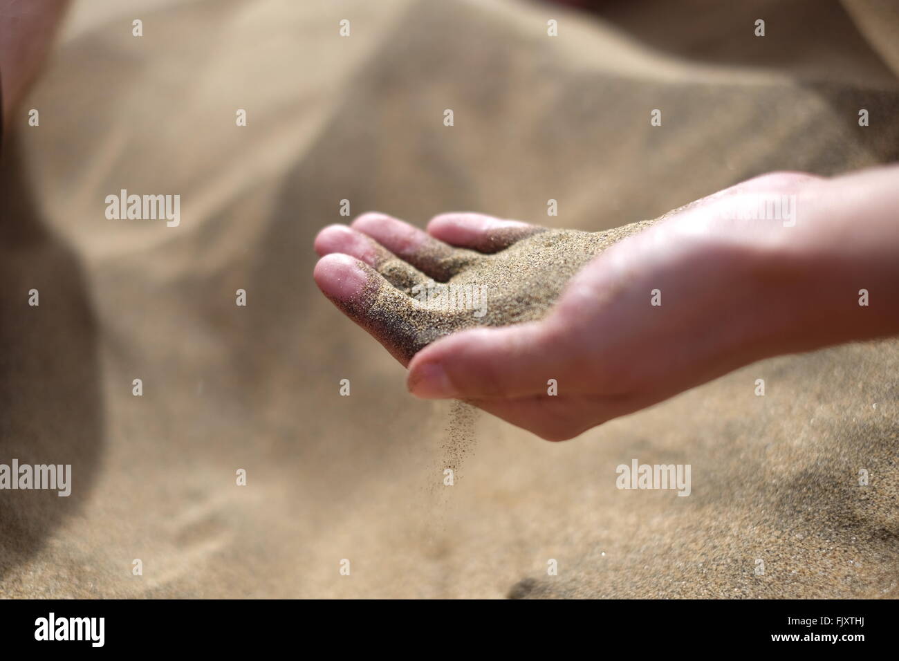 Person in the sand hi-res stock photography and images - Alamy